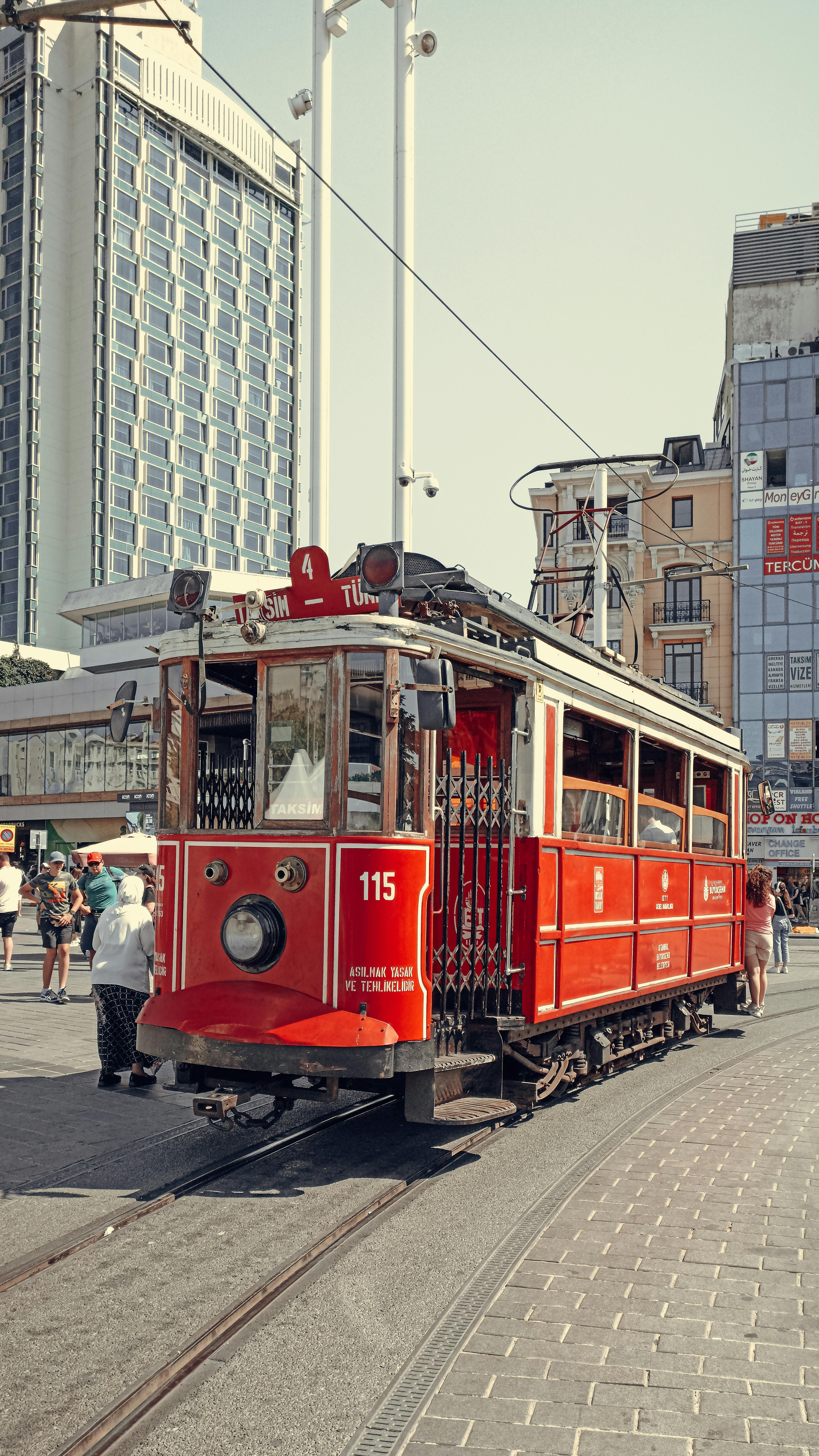 Red and White Tram on Road · Free Stock Photo