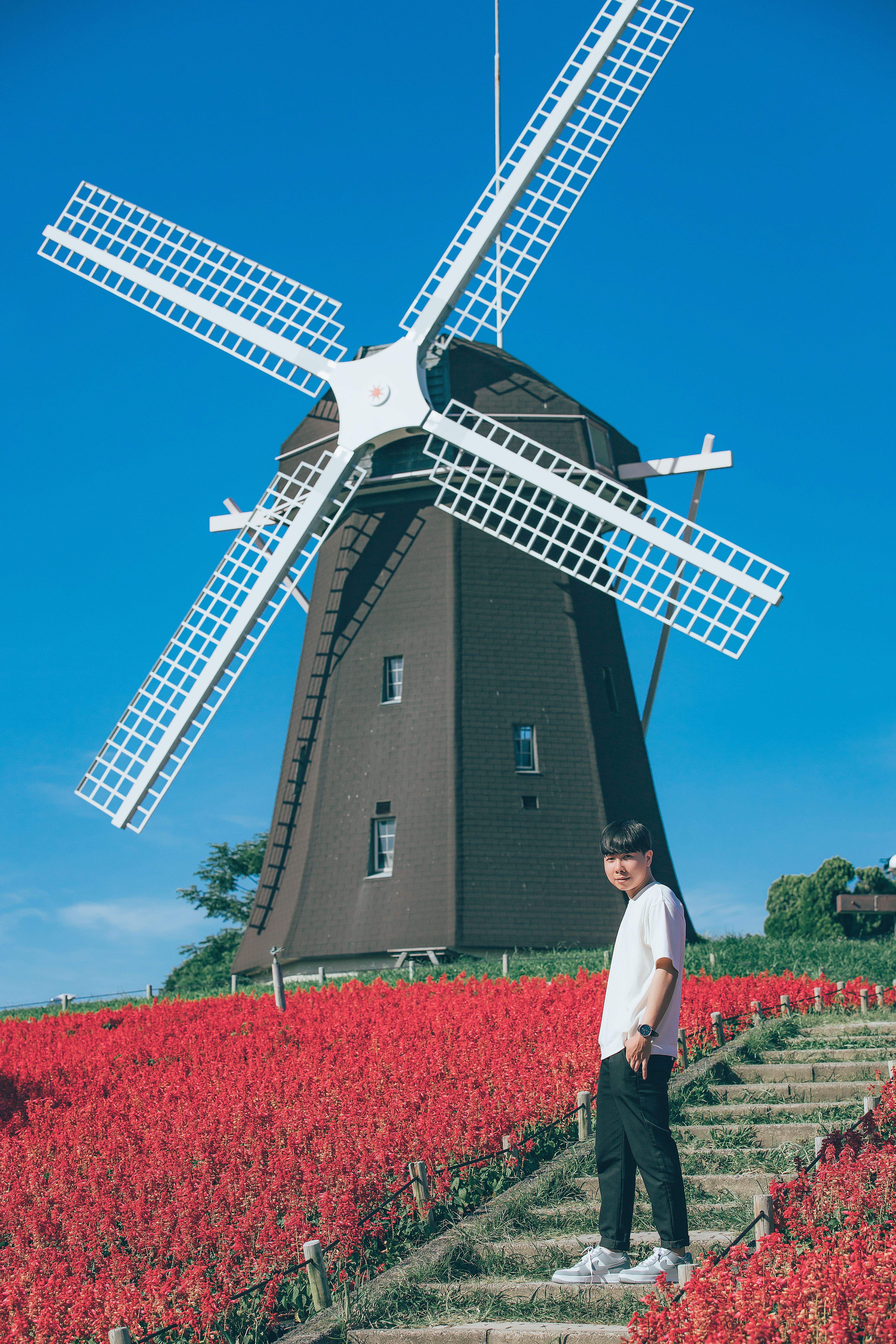 A Man Standing Near the Windmill · Free Stock Photo