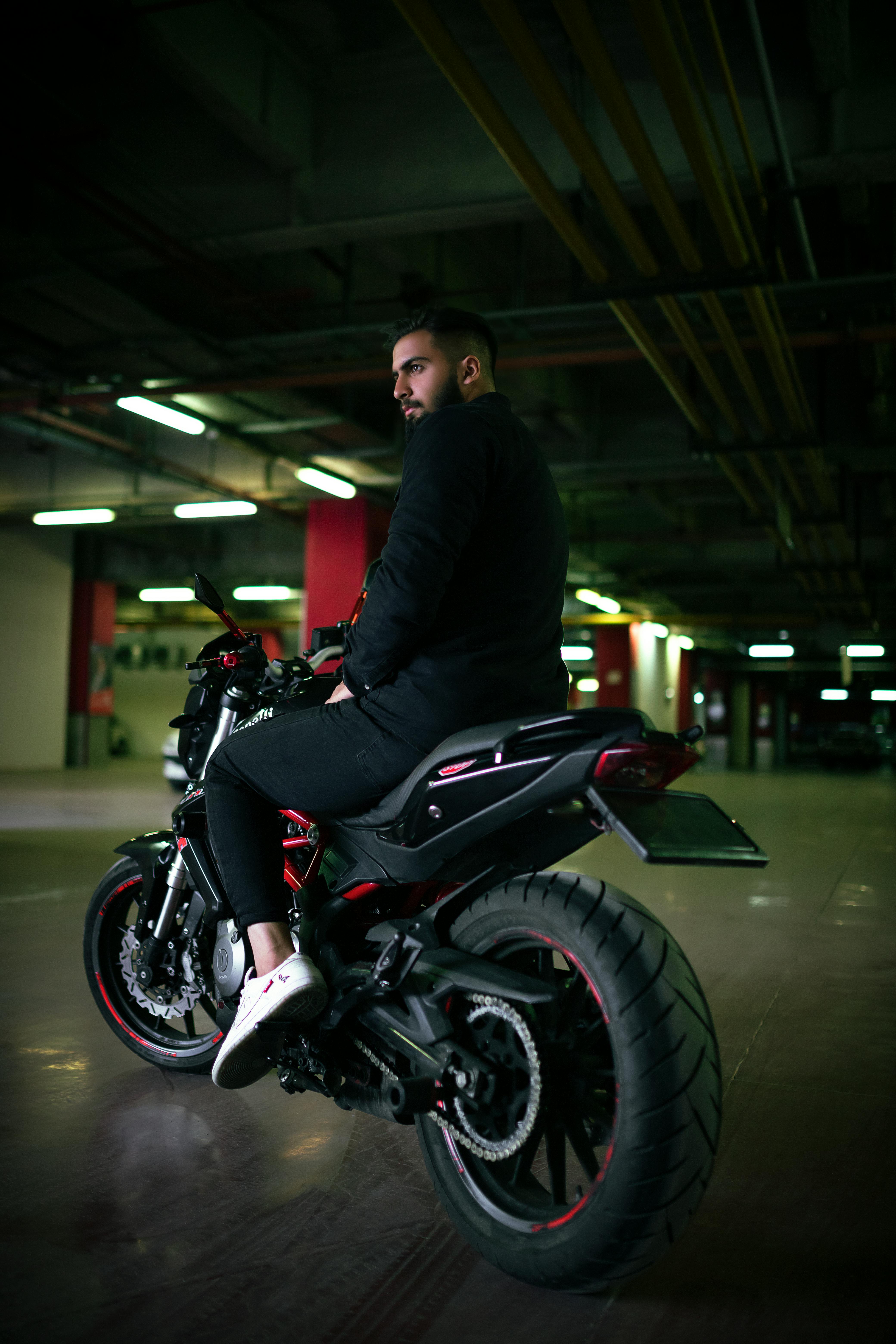 A Man Riding a Motorcycle · Free Stock Photo