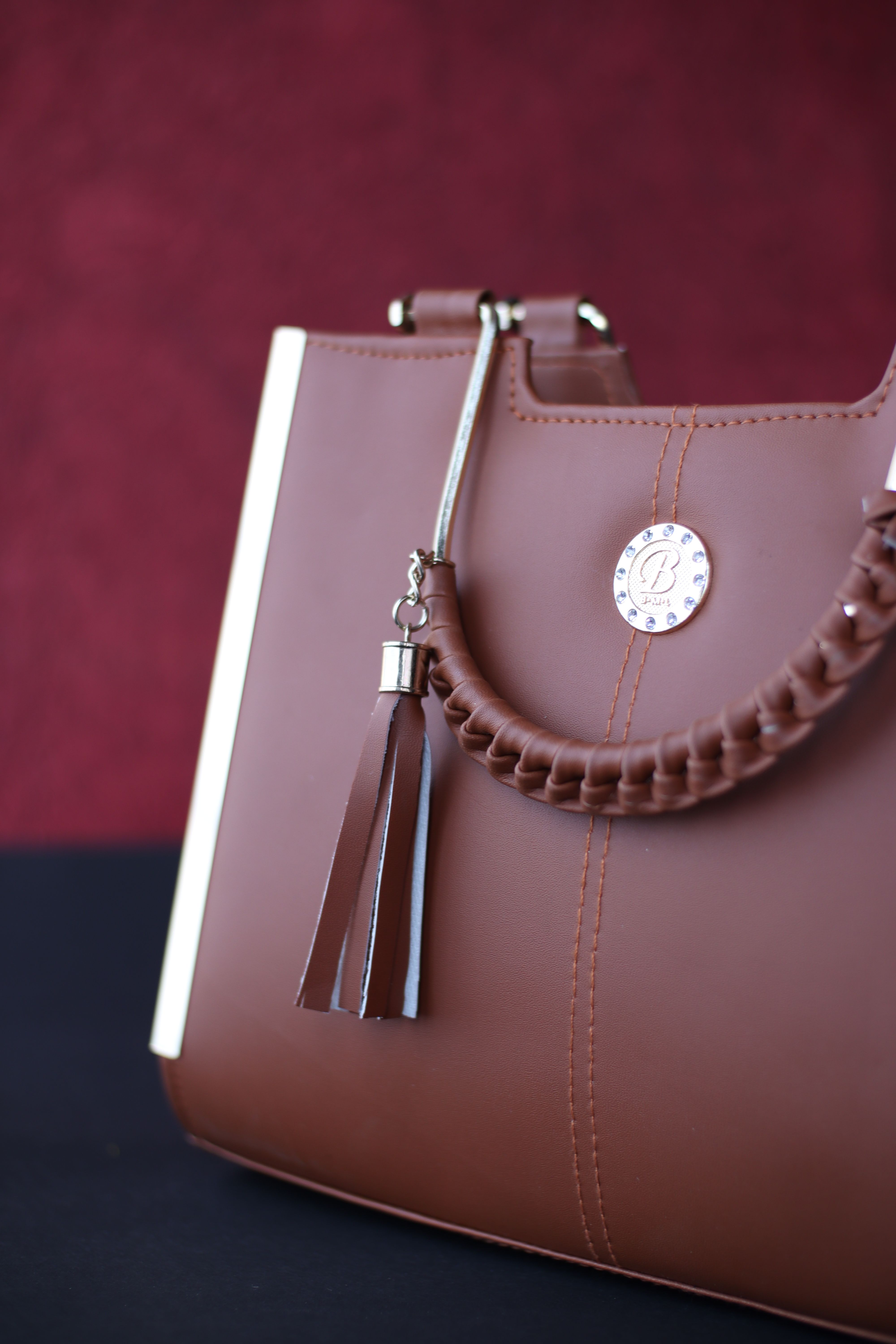 Leather Handbag on Green Velvet Accent Chair · Free Stock Photo