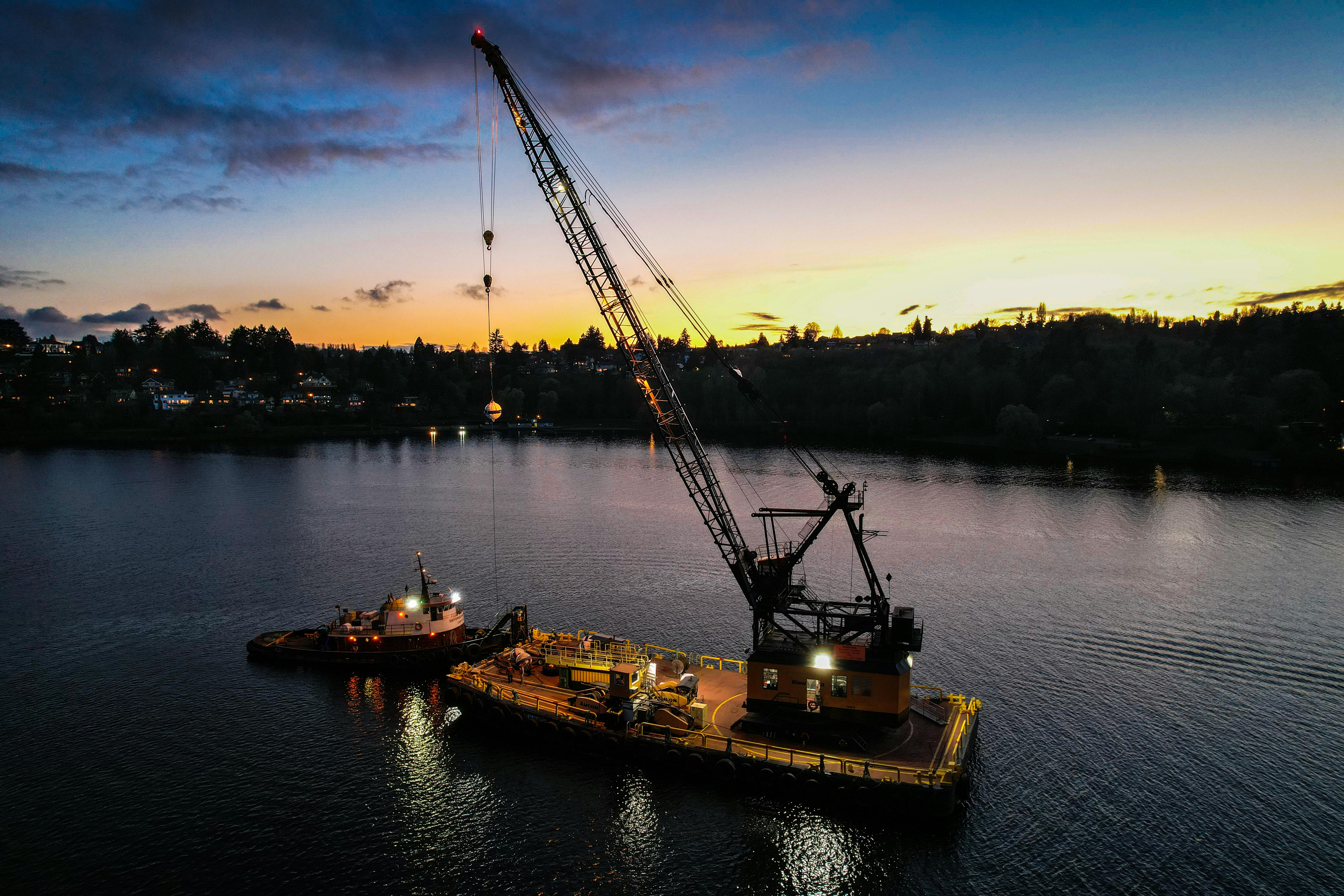 Crane on Barge at Sunset · Free Stock Photo