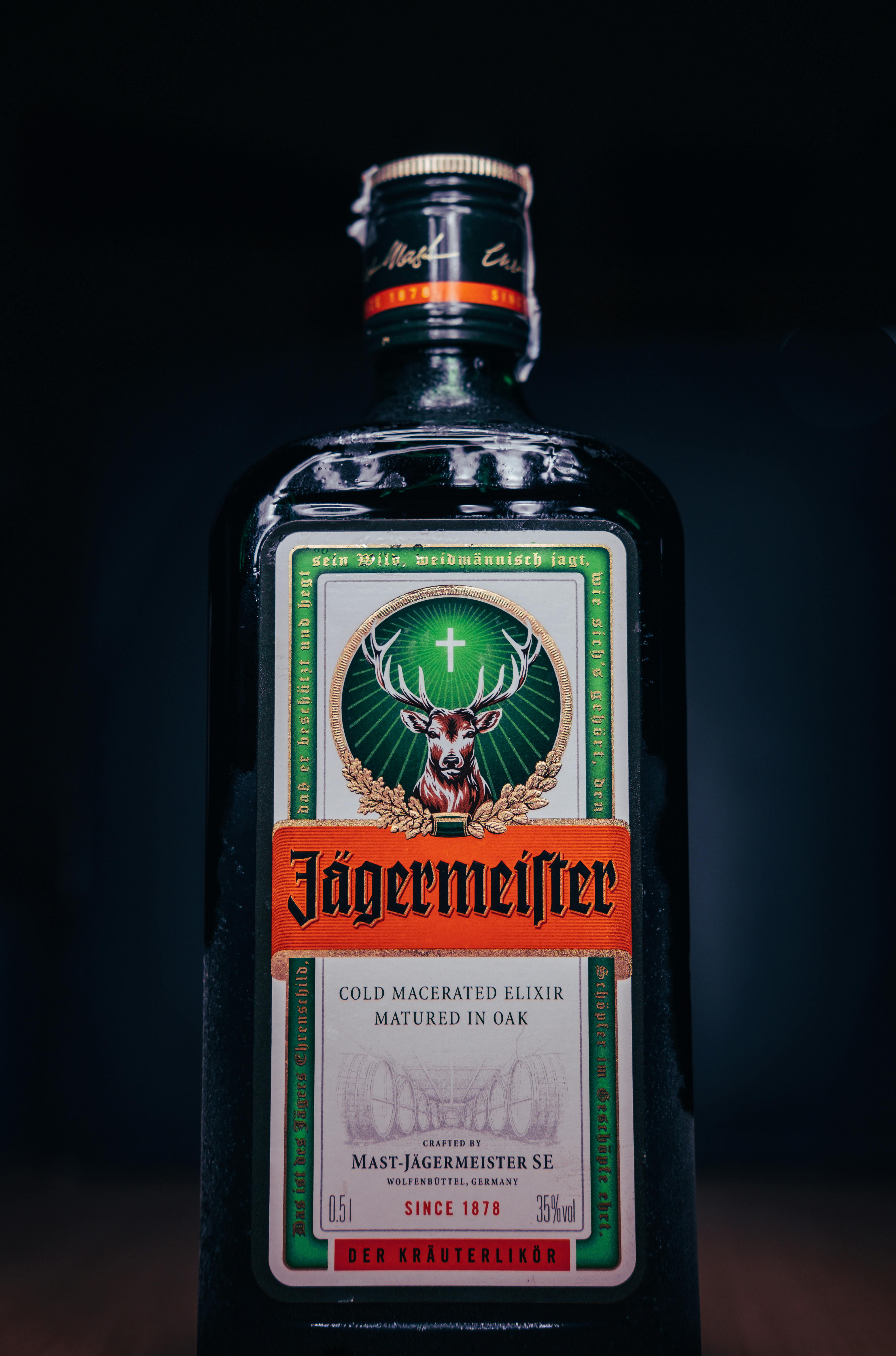 Close-up Shot of Jägermeister Bottle · Free Stock Photo