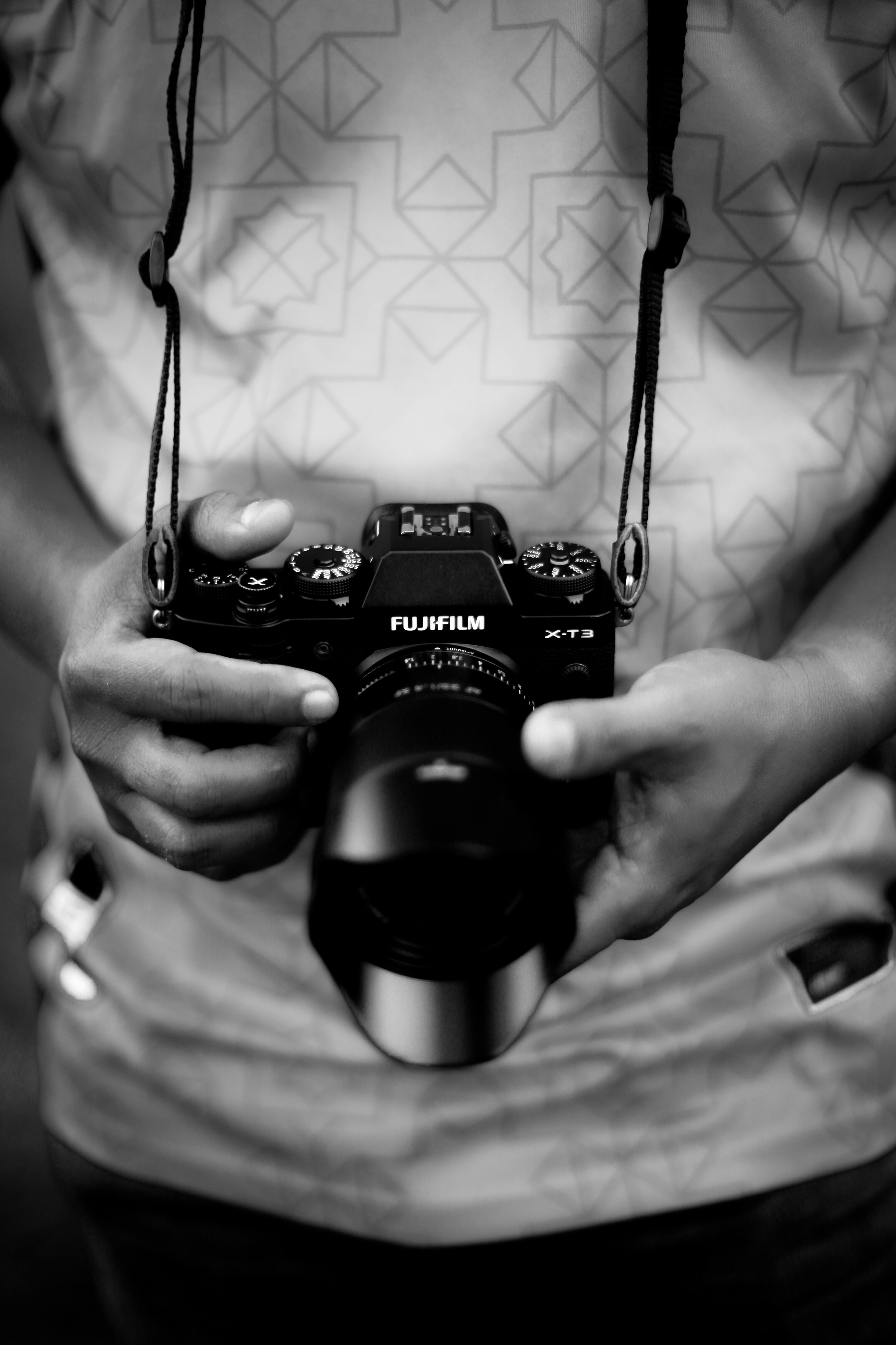 A Person Holding a Camera · Free Stock Photo
