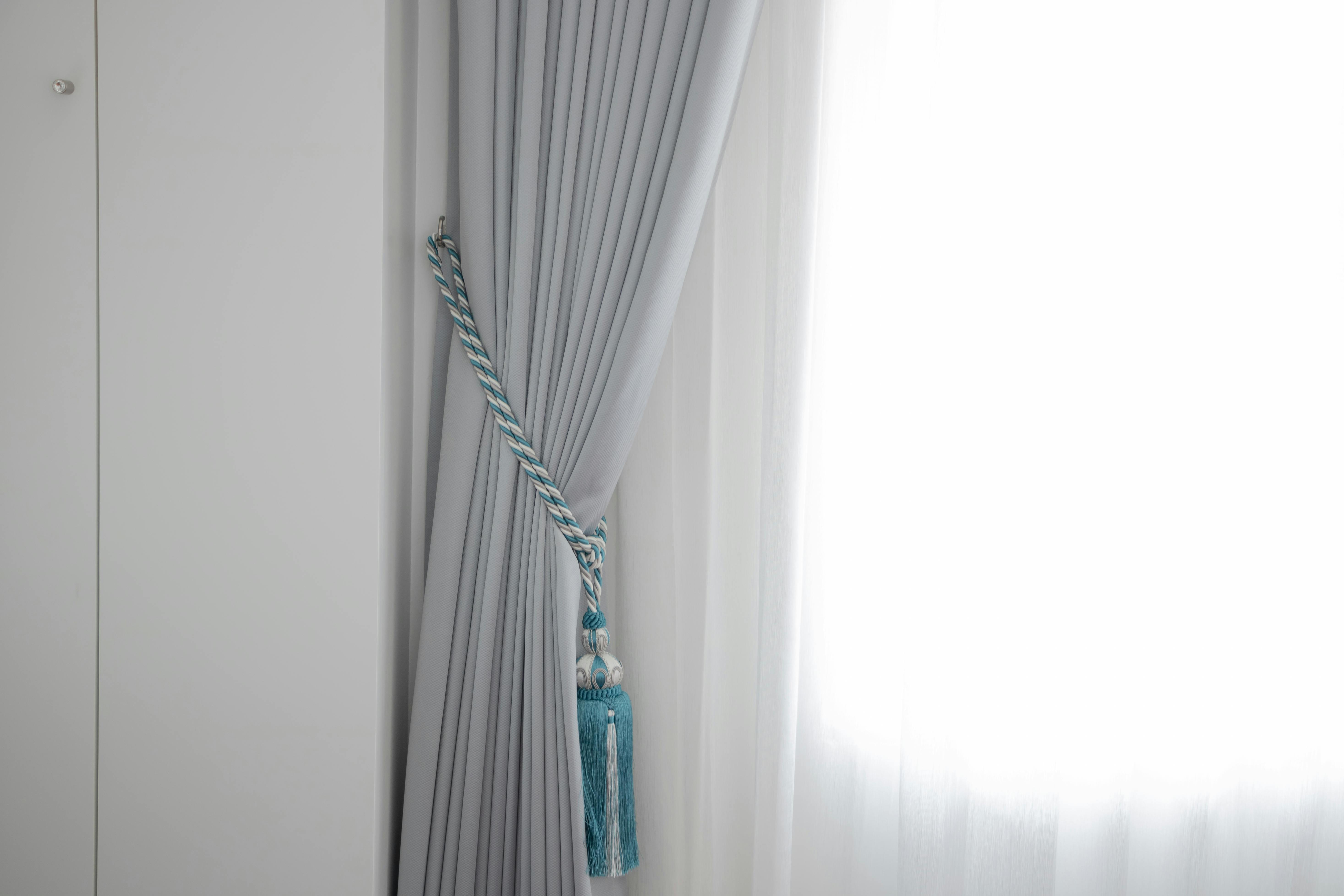 Close-up View of Curtains with Floral Theme · Free Stock Photo