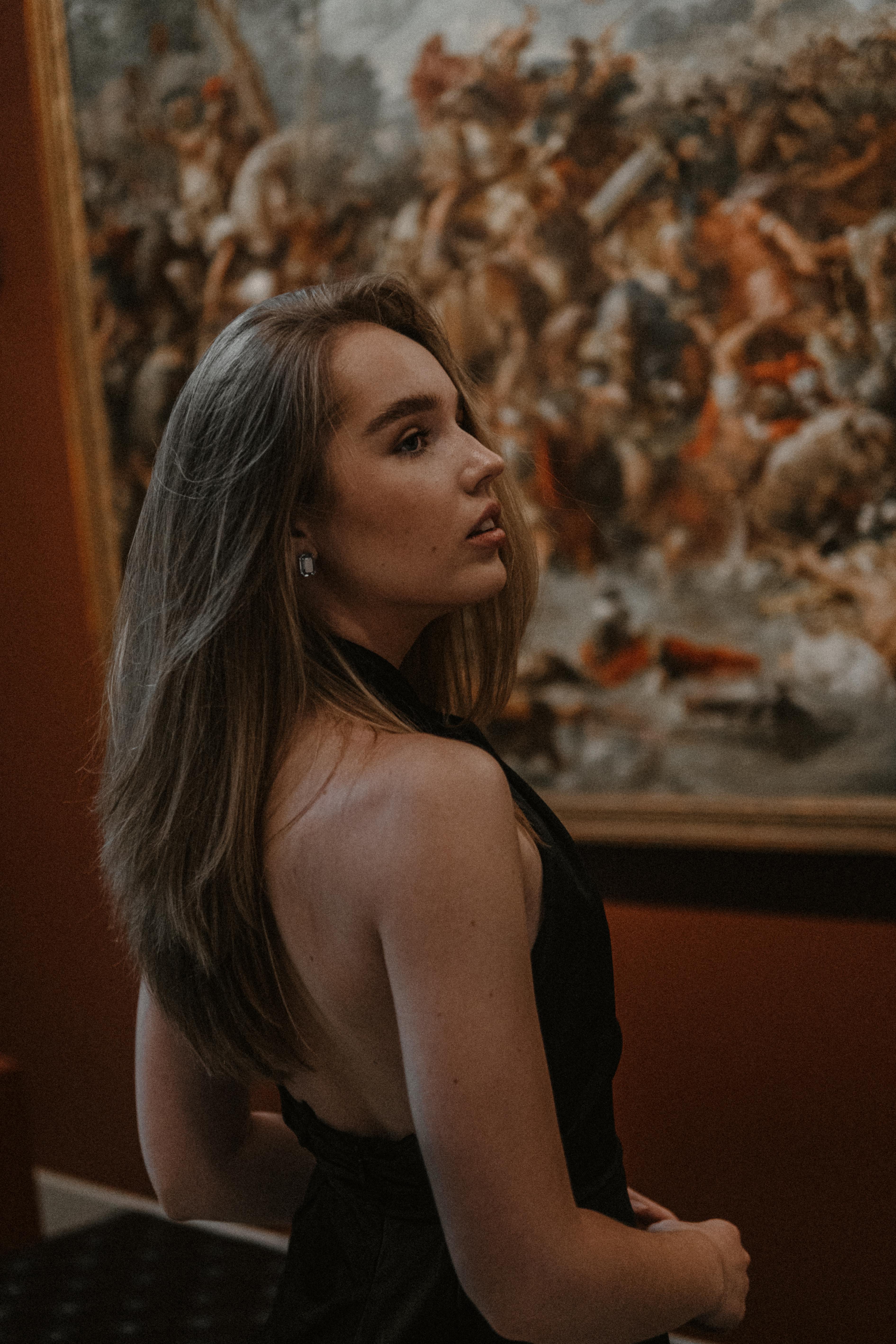 A Woman Wearing a Backless Dress · Free Stock Photo