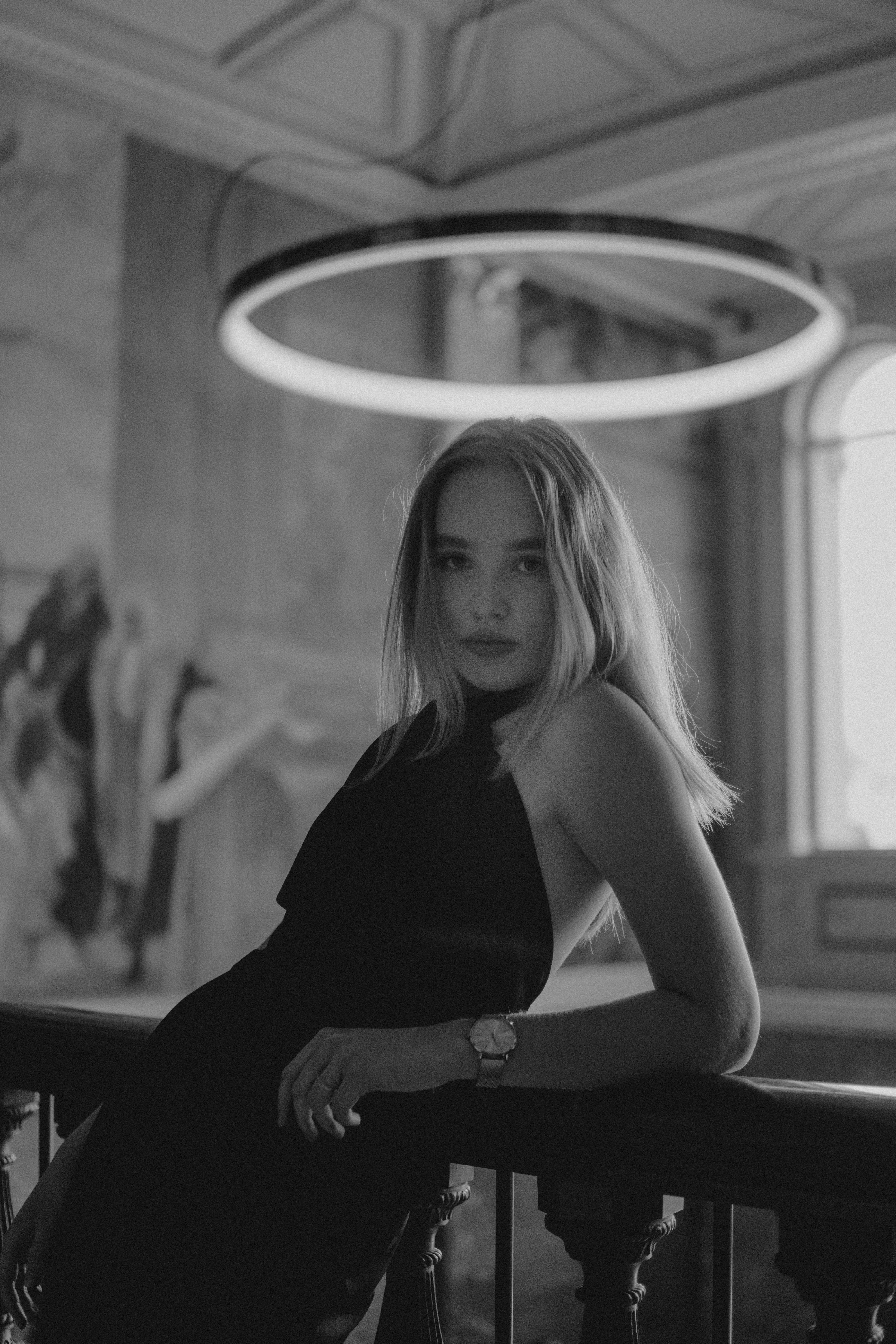 Woman in Black Dress Posing for a Photoshoot · Free Stock Photo