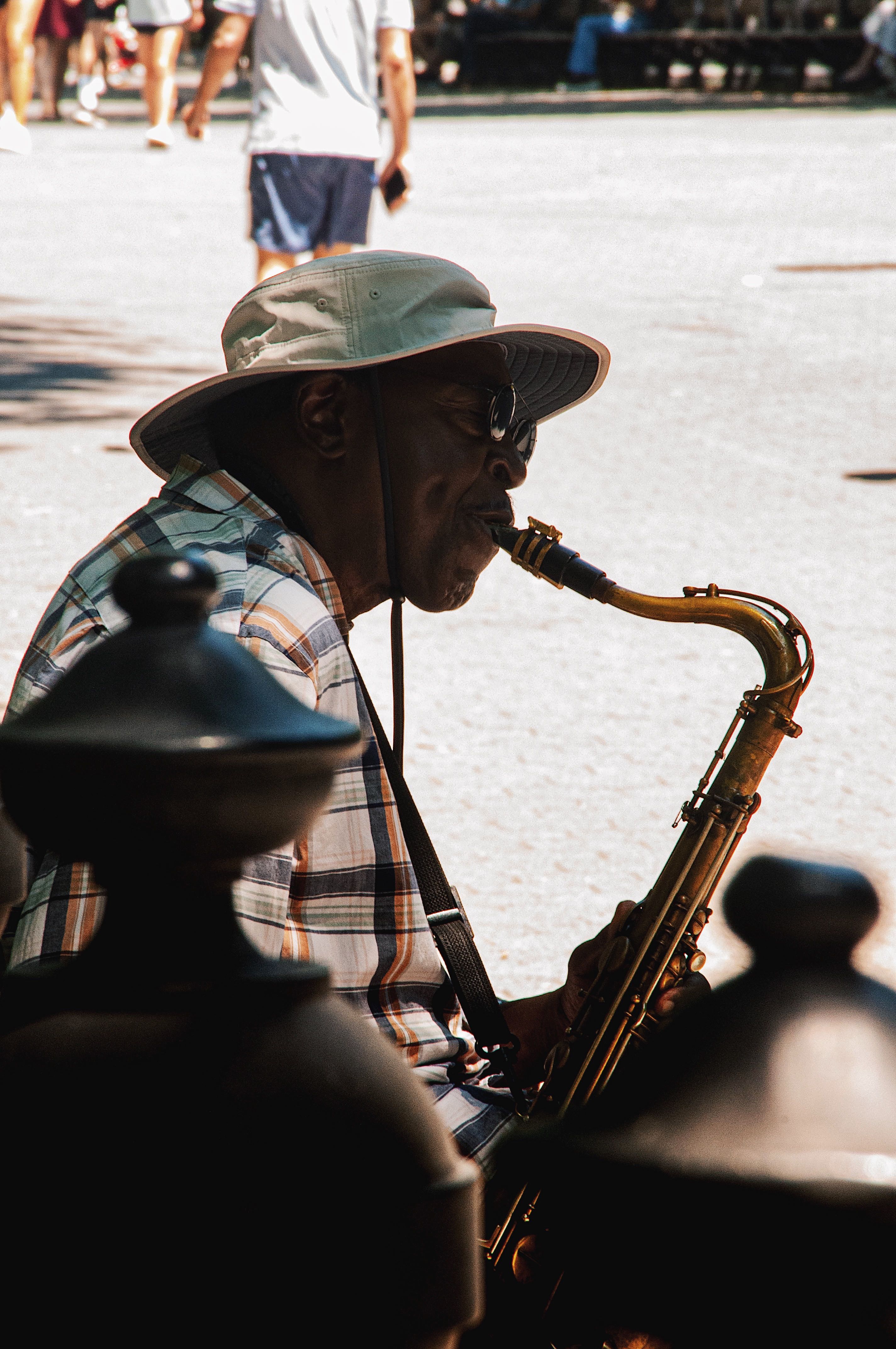 Man in Gray Plaid Blazer Playing Saxophone · Free Stock Photo
