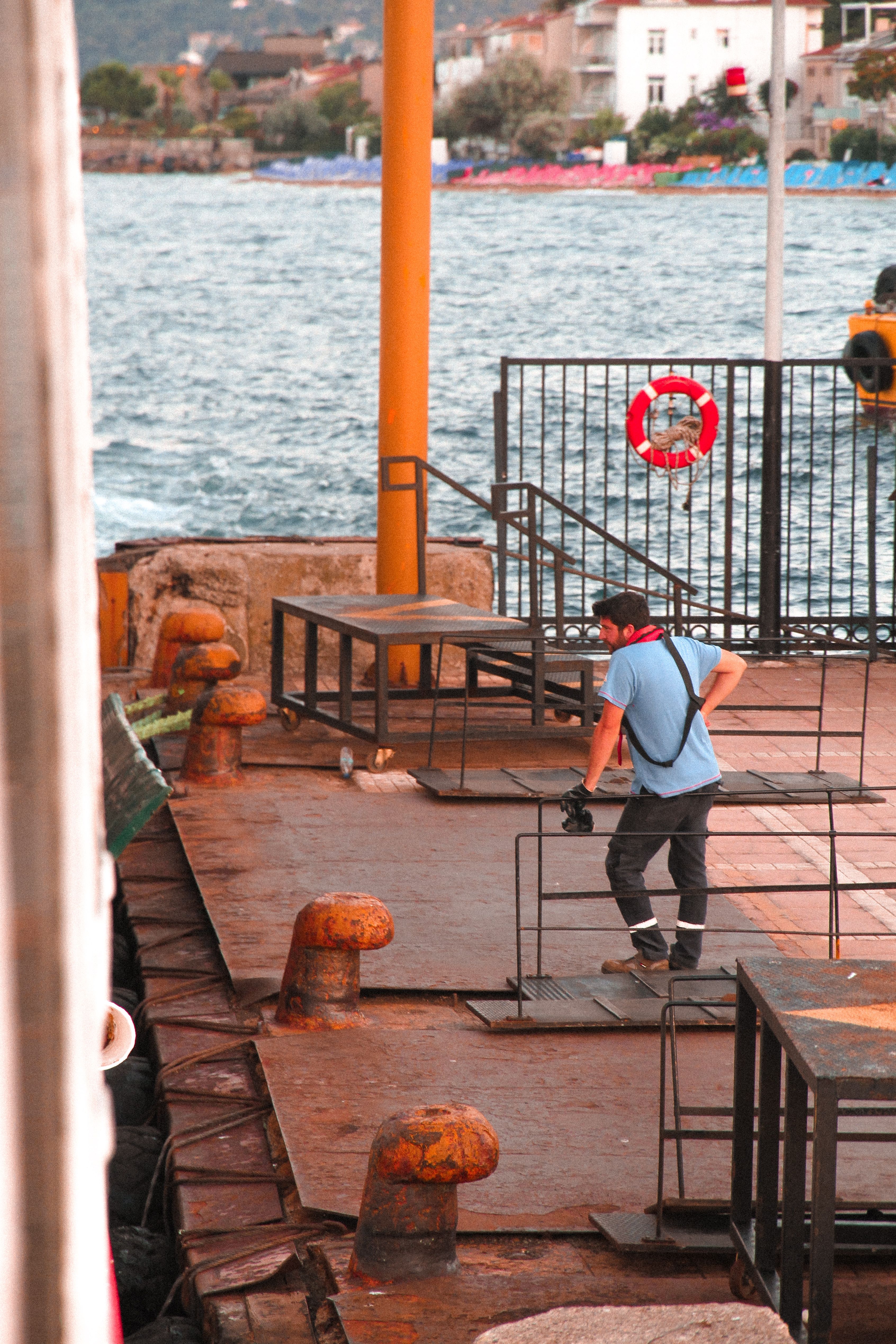 Man Standing on a Dock · Free Stock Photo