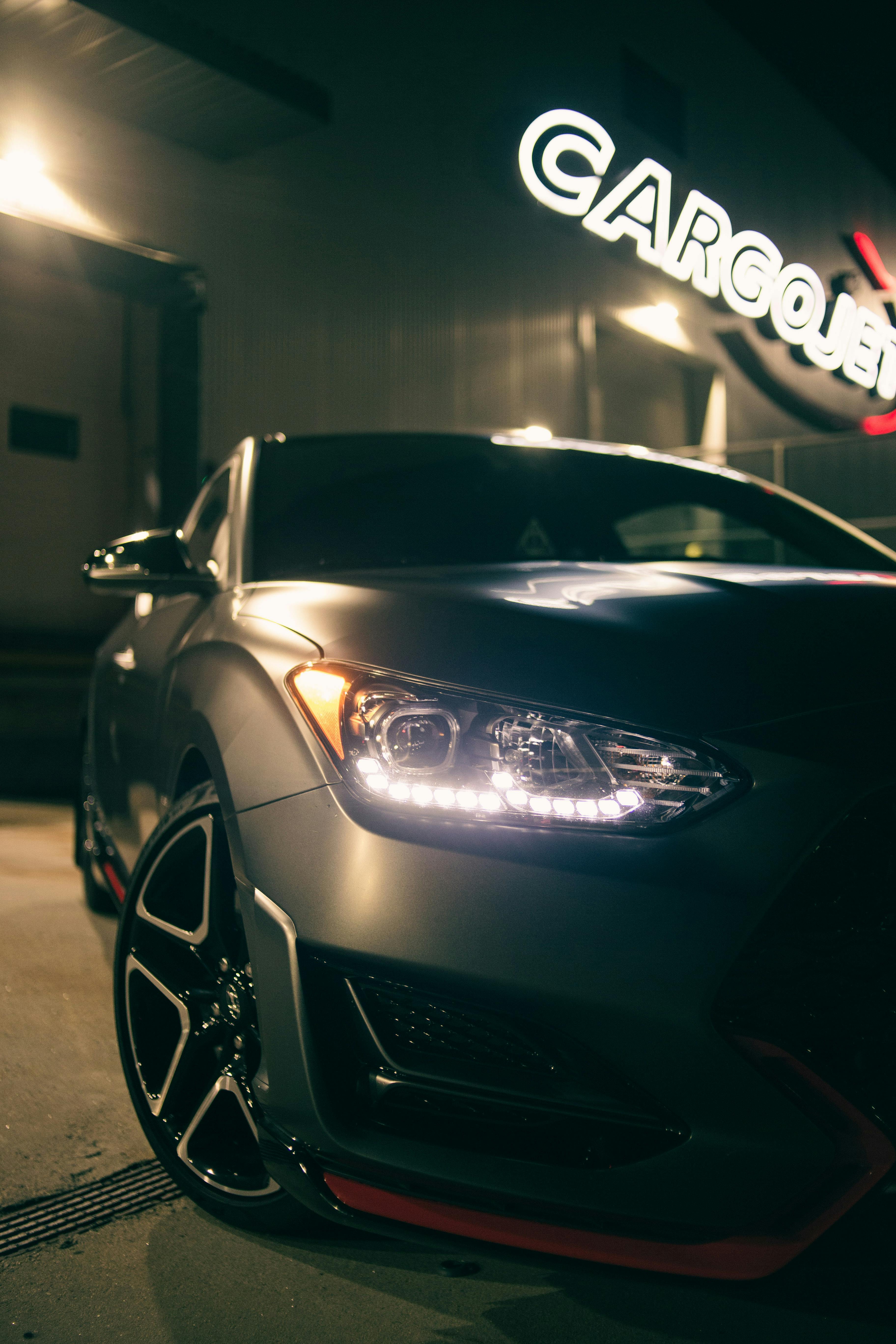 Back Car with Headlights on · Free Stock Photo