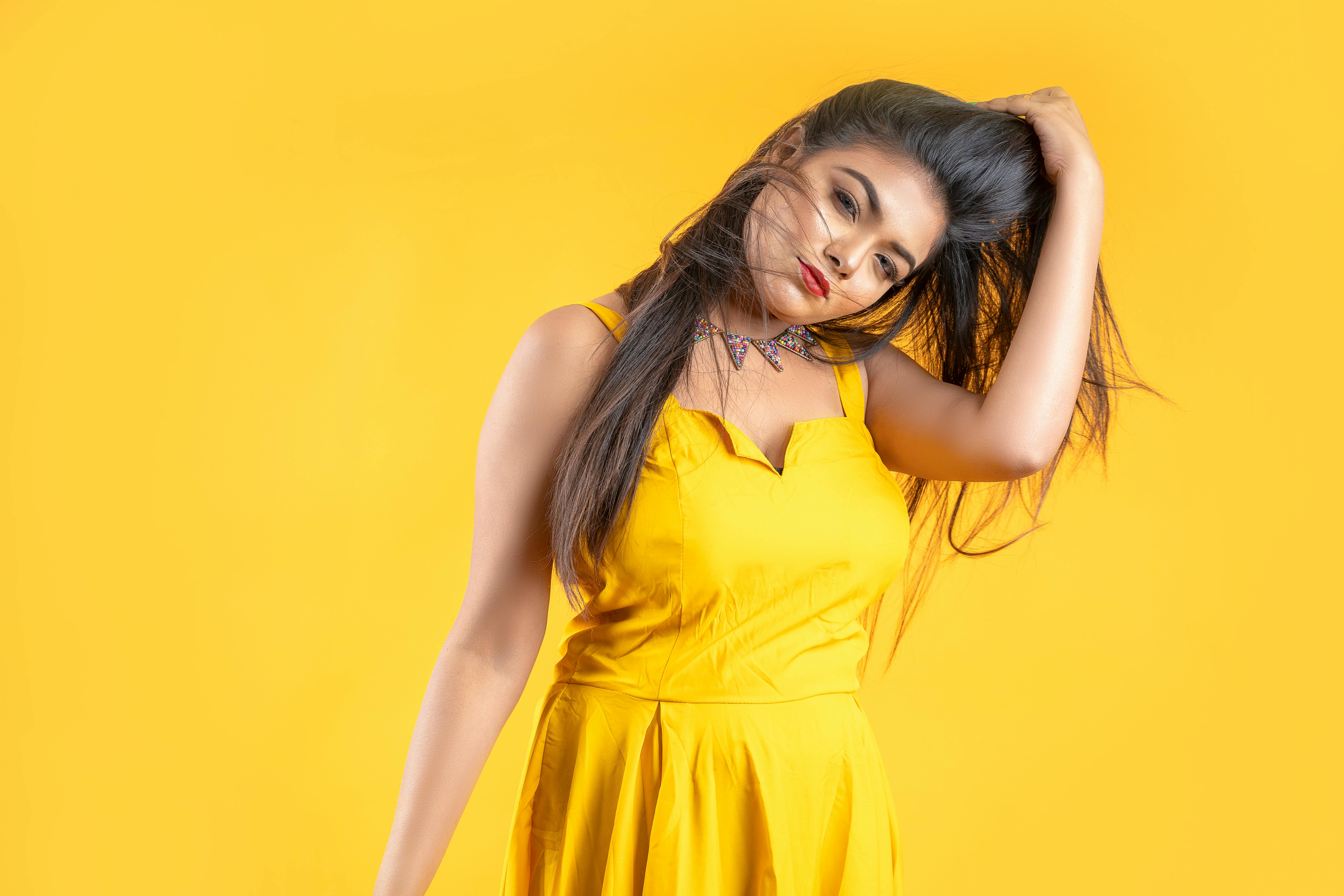 A Beautiful Woman Wearing Yellow Dress · Free Stock Photo