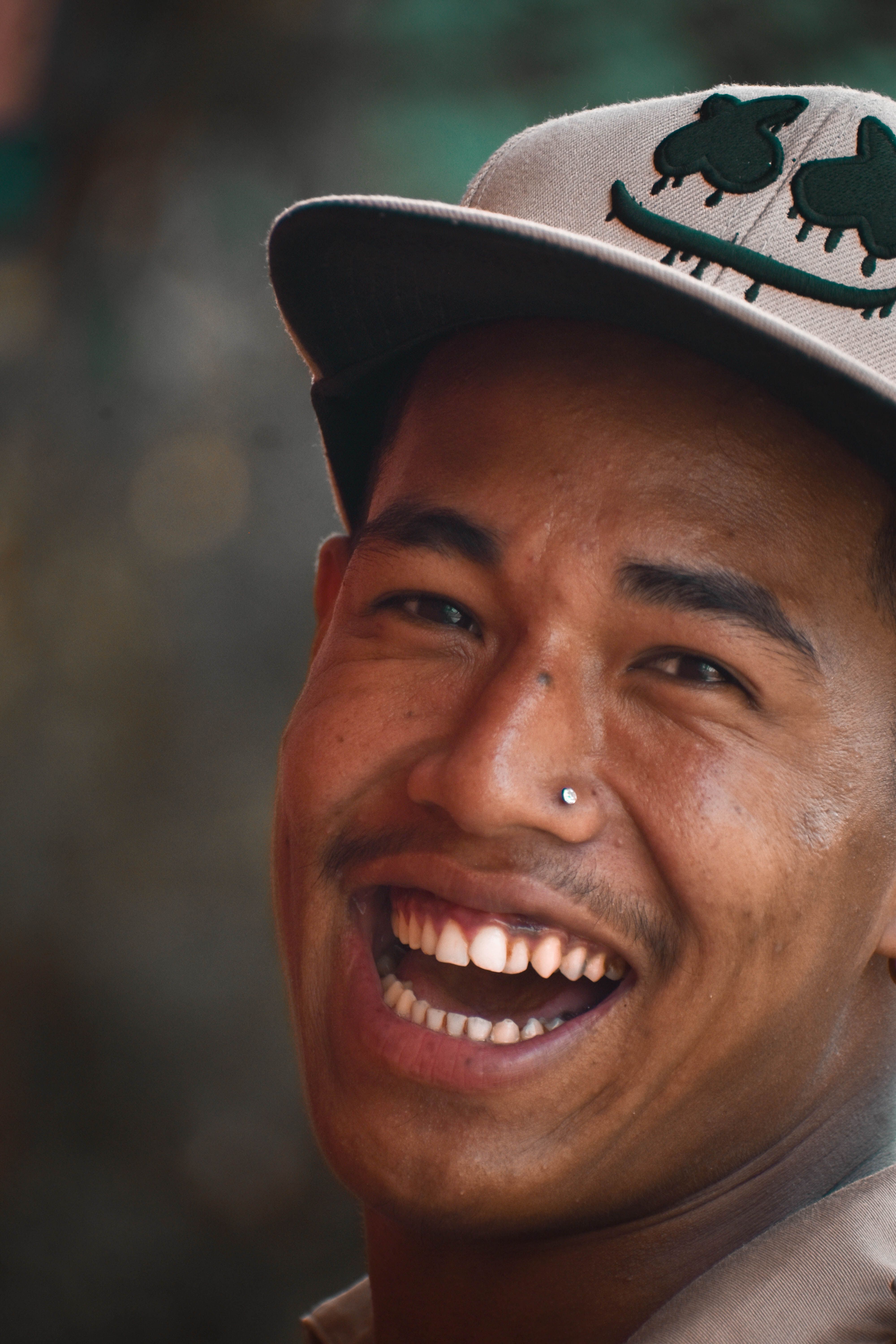 A Happy Man with a Nose Piercing · Free Stock Photo