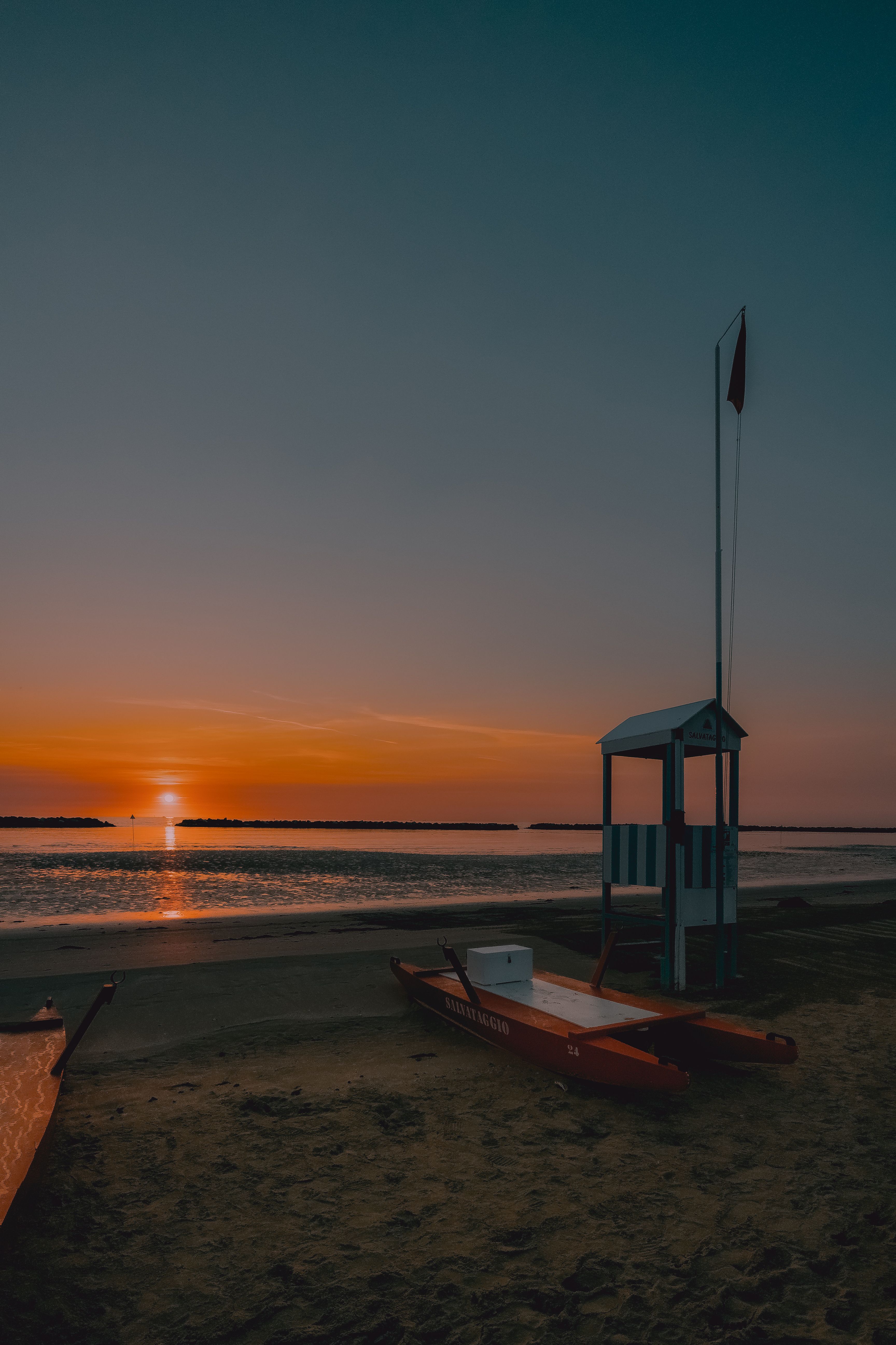 White Wooden Lifeguard Post on Beach during Sunset · Free Stock Photo