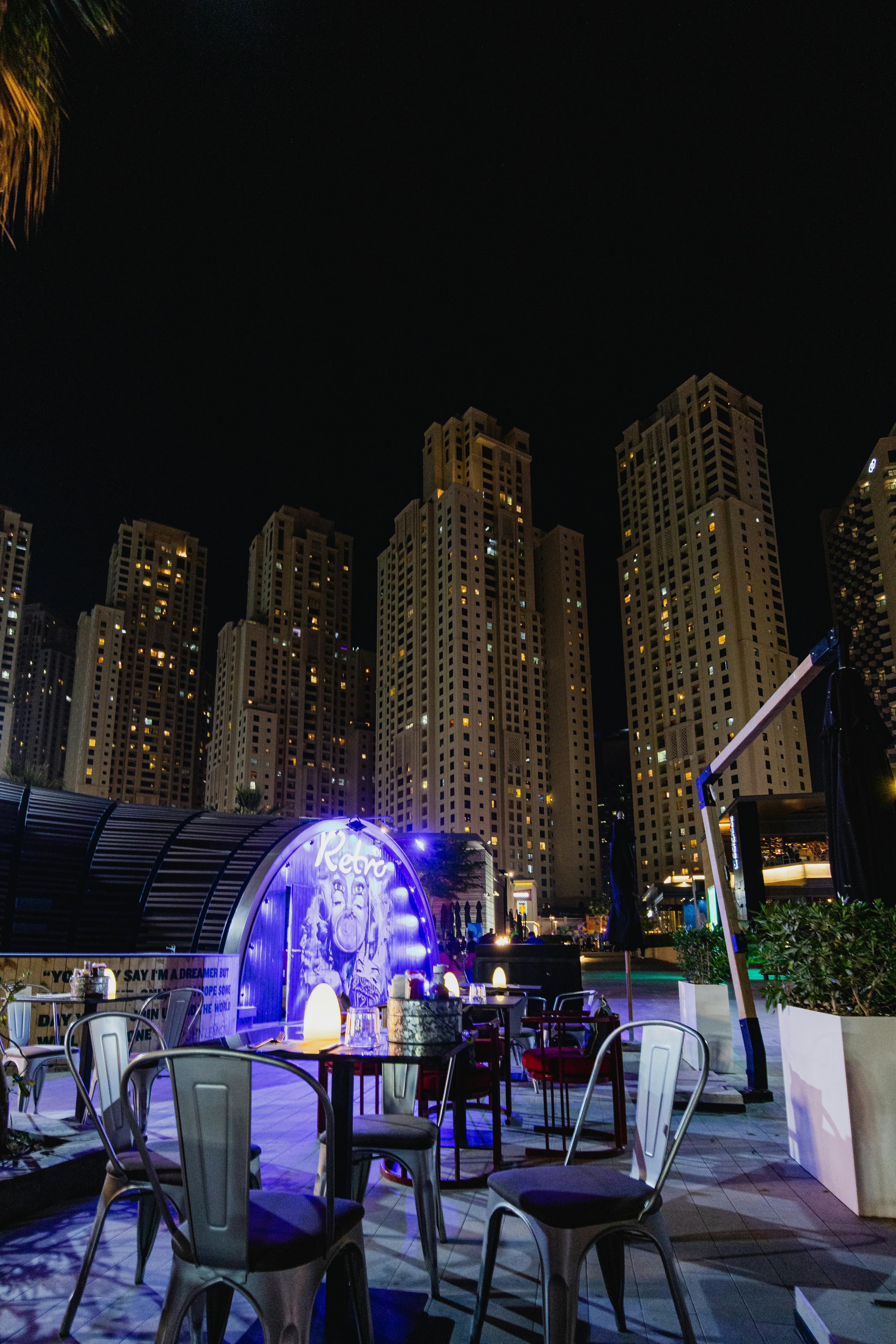 Outdoor Terrace near Skyscrapers in City Downtown at Night · Free Stock ...