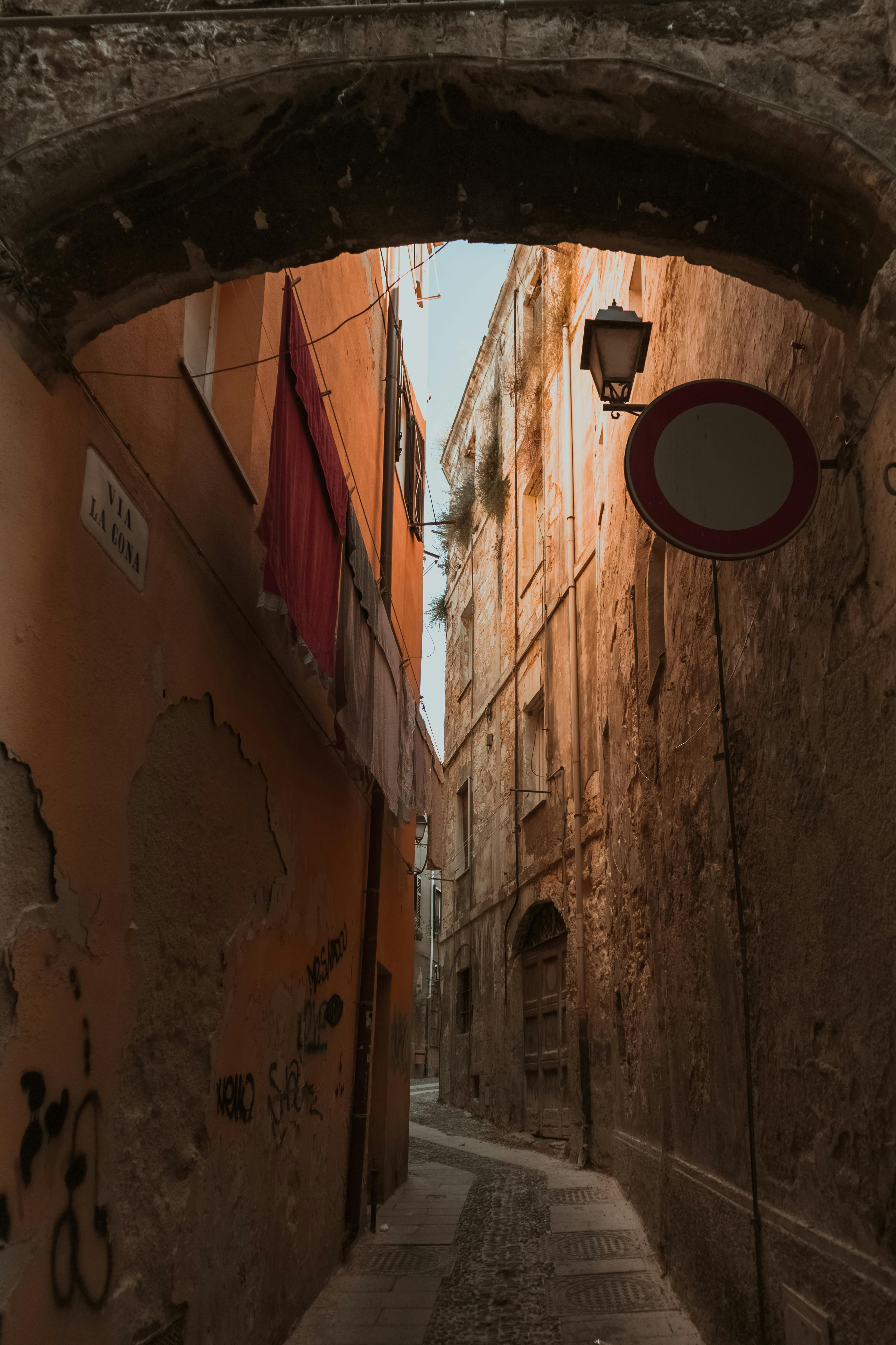A Narrow Alley between Buildings in City · Free Stock Photo