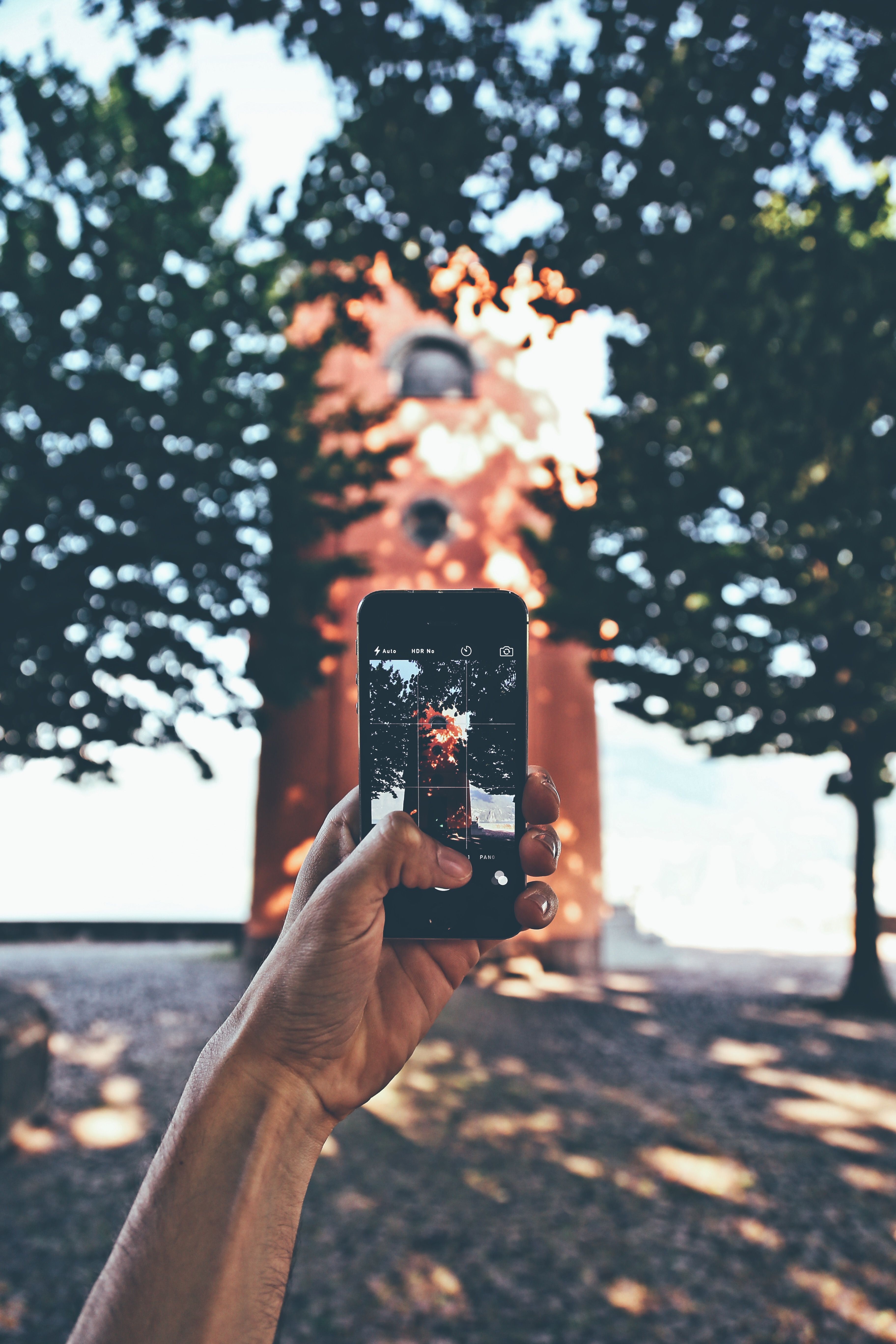 Person Using a Spotify on His Smartphone · Free Stock Photo