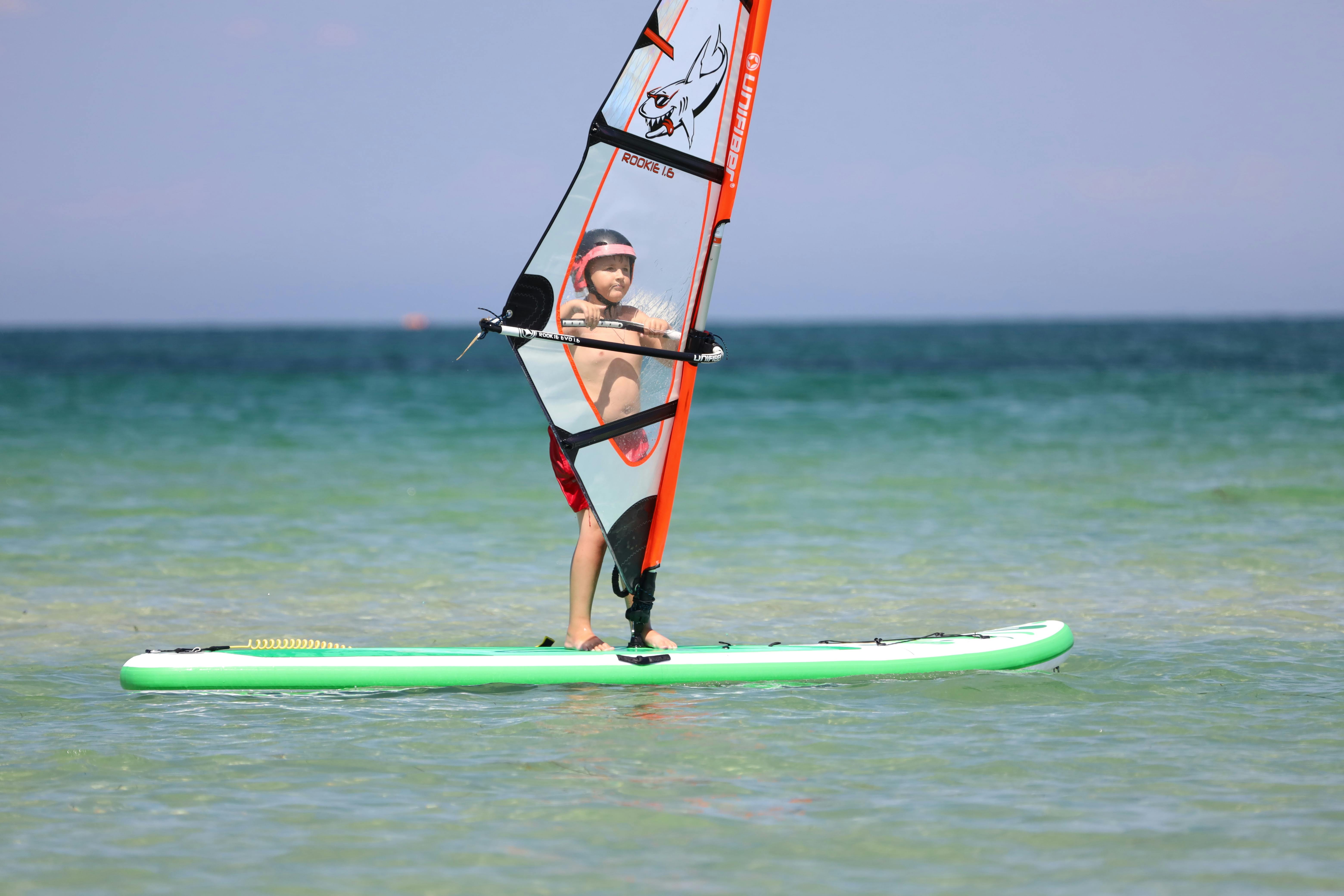 Boy Training Windsurfing · Free Stock Photo