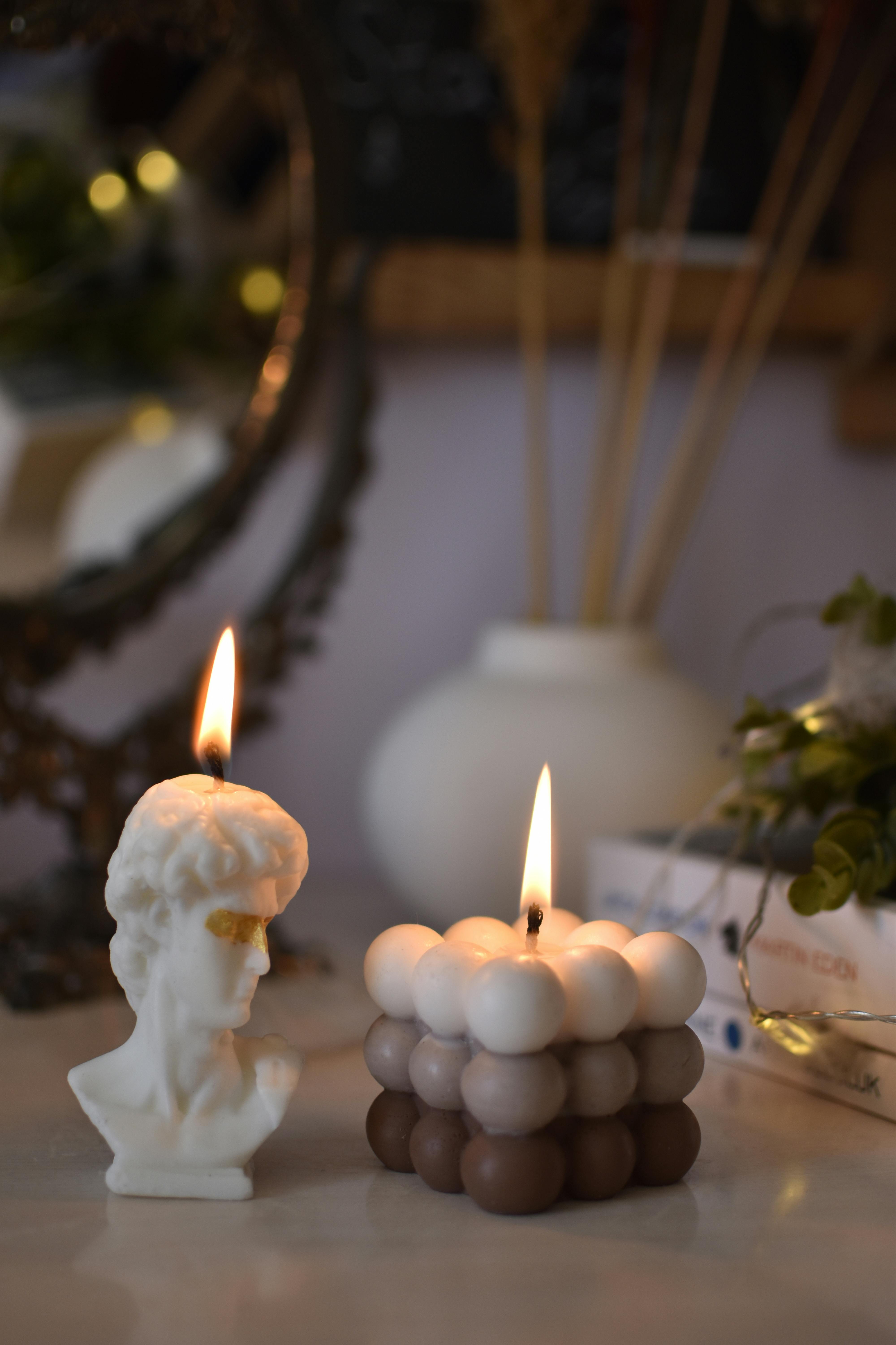 Close-Up Shot of Burning Candles · Free Stock Photo