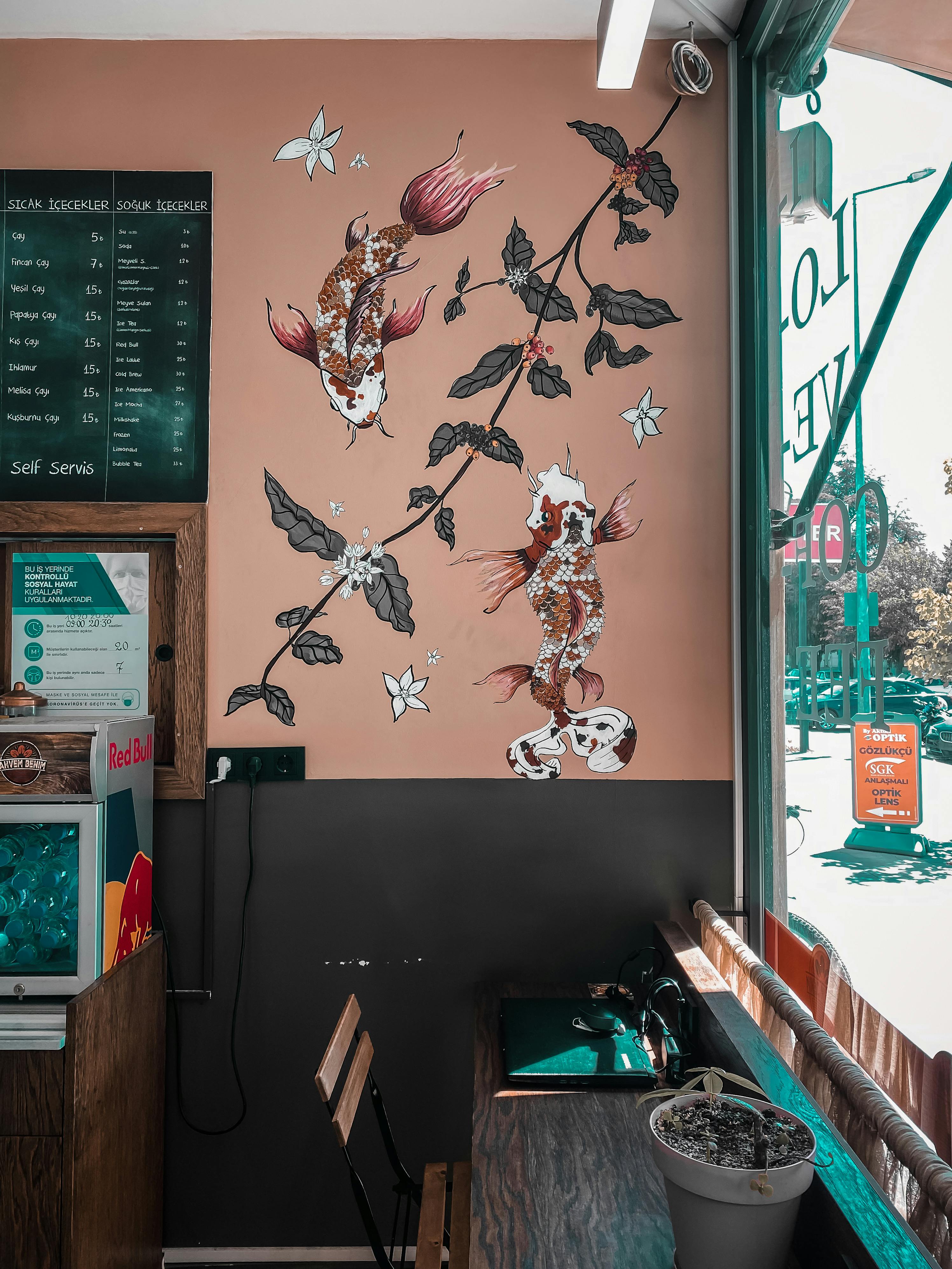 Glass Window Beside the Wooden Table · Free Stock Photo