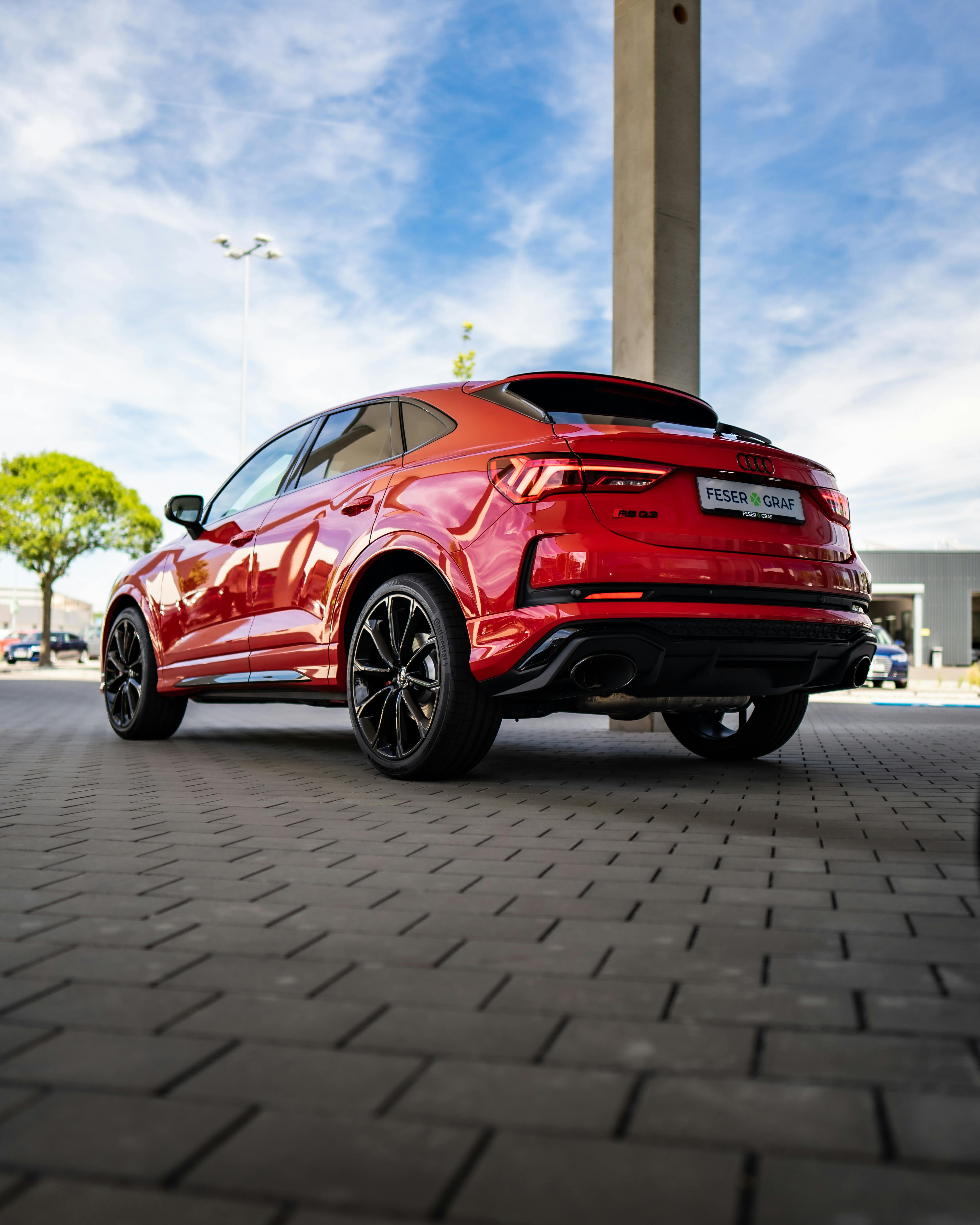Back View of a Red Sports Car · Free Stock Photo