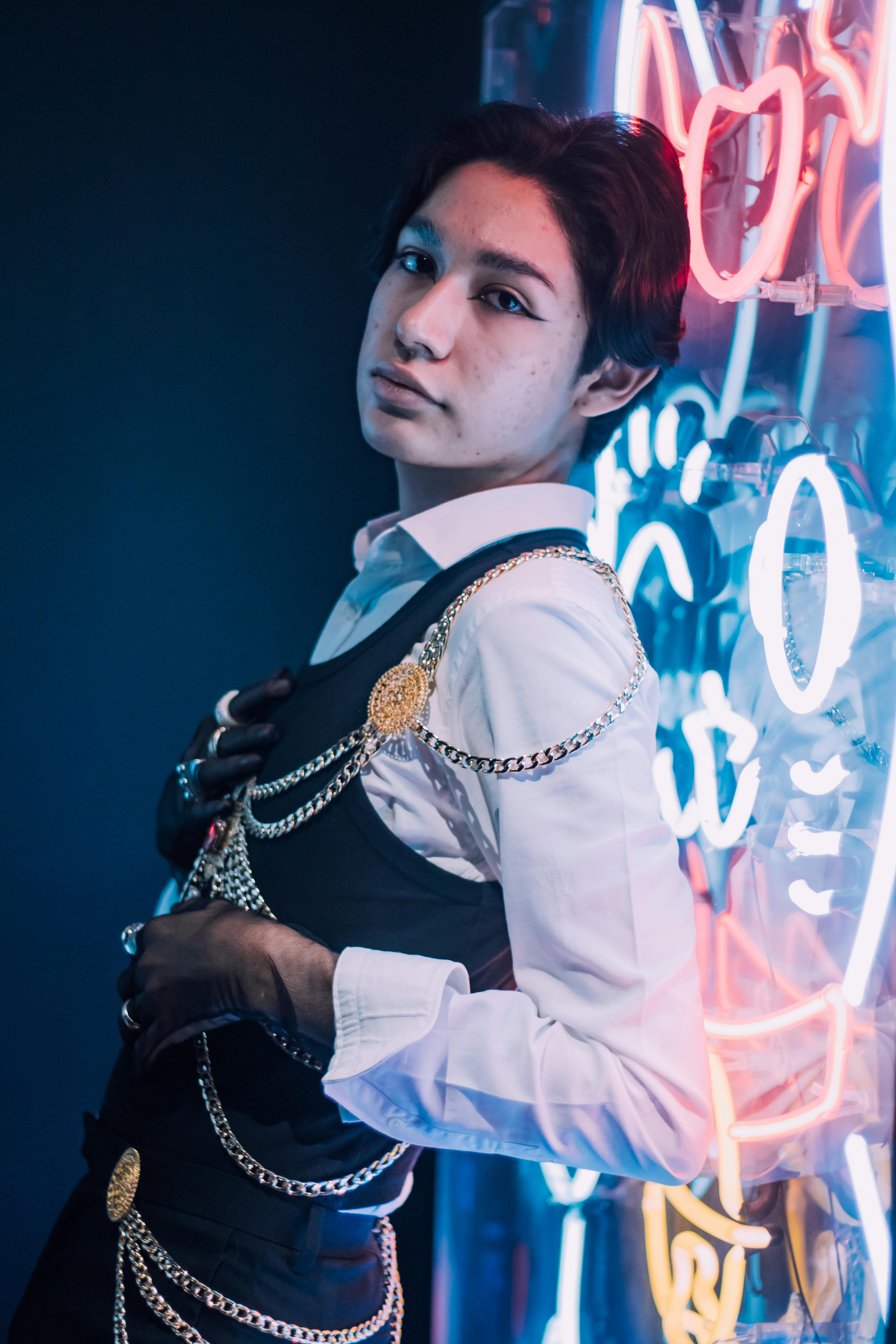 Model Leaning against Neon · Free Stock Photo