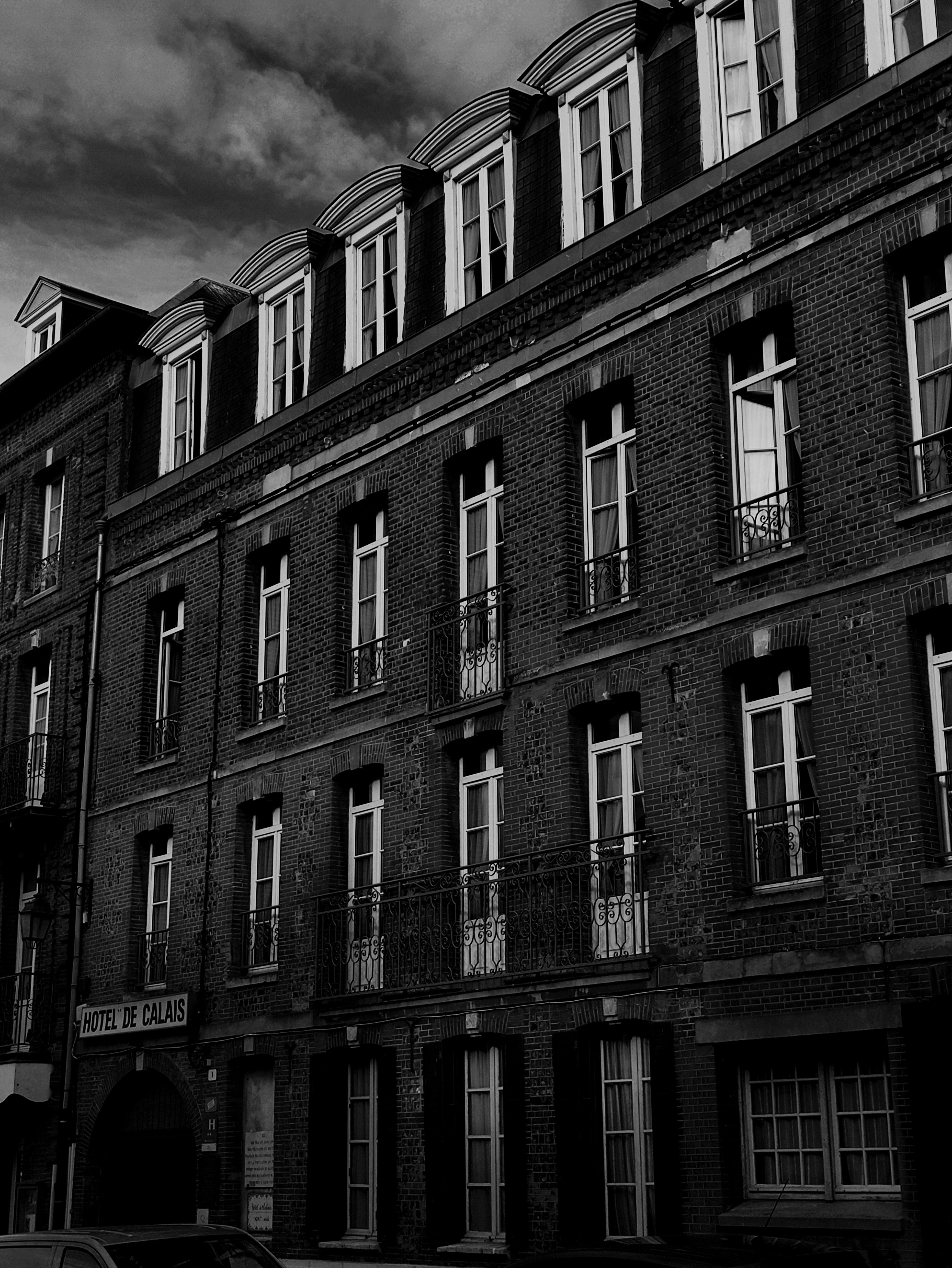 Grayscale Photo of a Building · Free Stock Photo