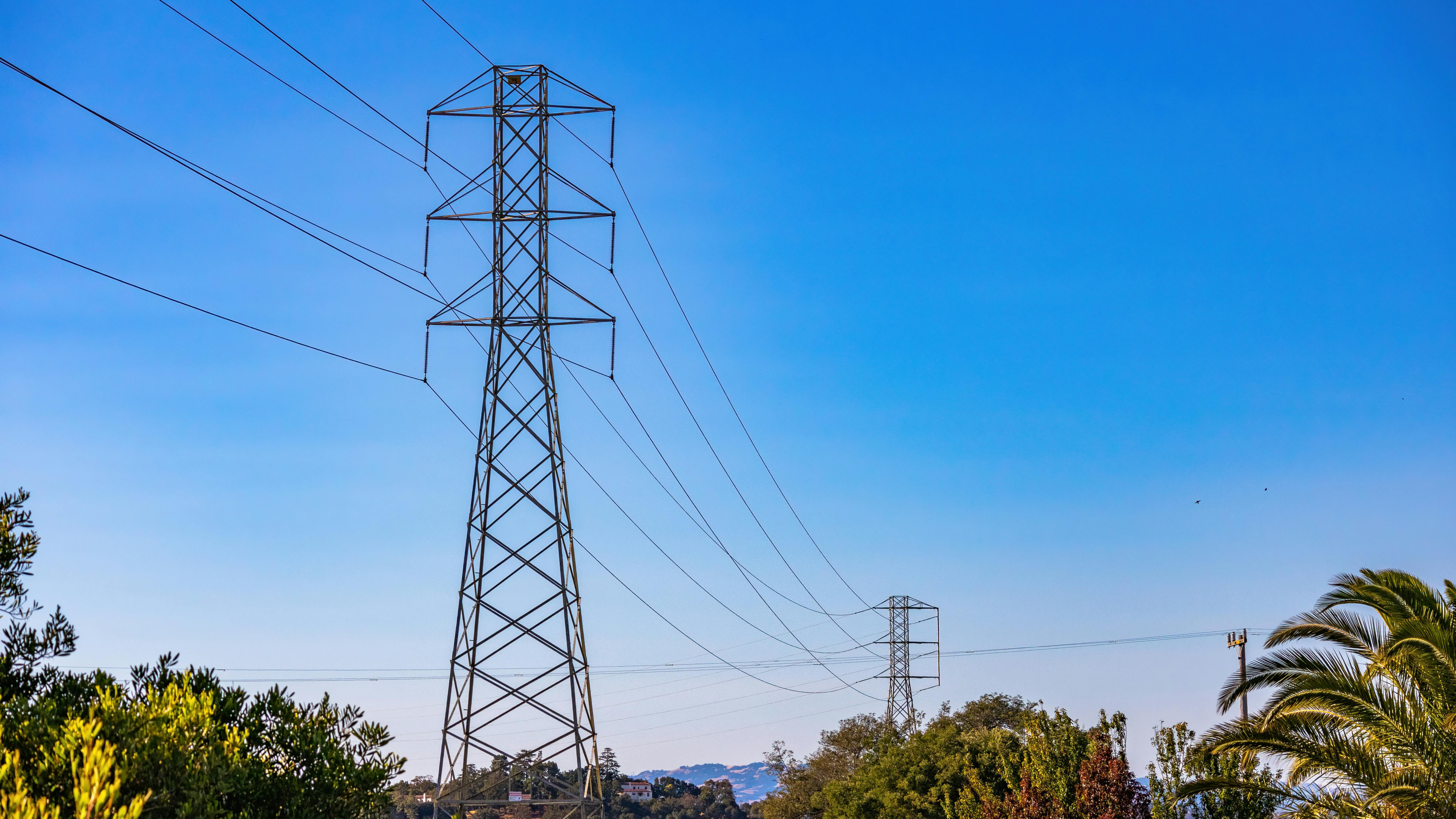 Gray Steel Electric Tower Under Blue Sky · Free Stock Photo