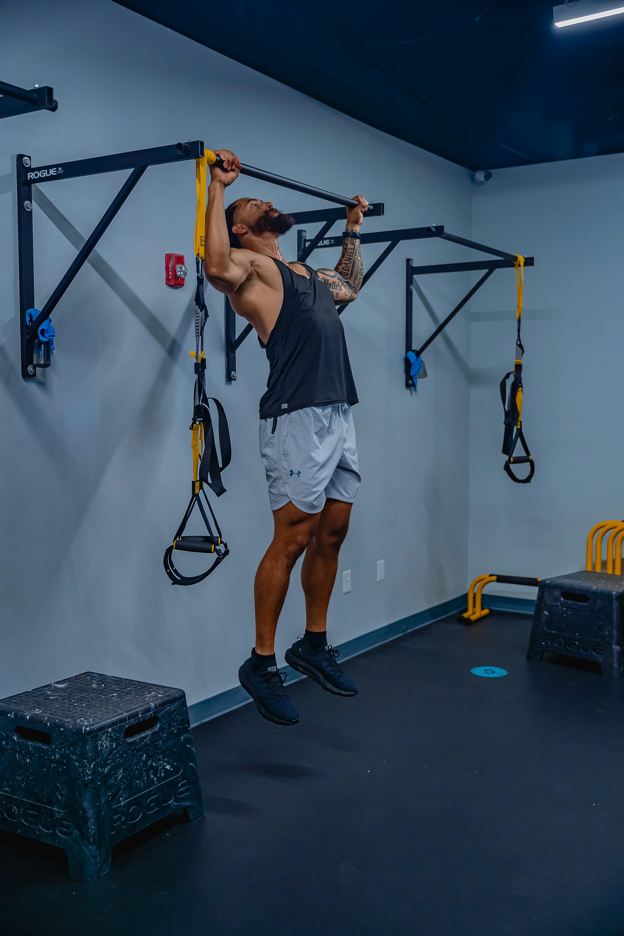 A Man Doing Exercise using Pull Ups · Free Stock Photo