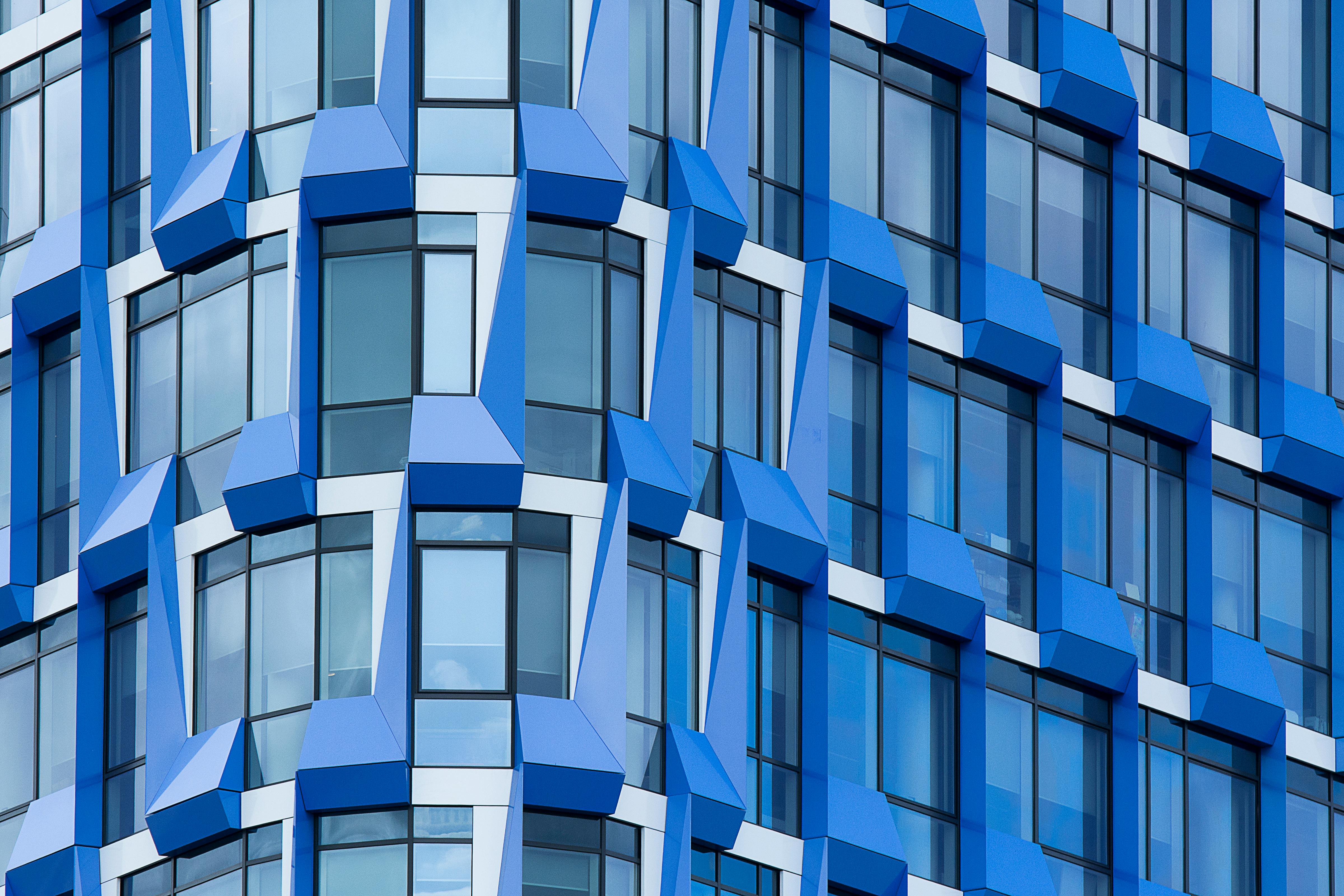 Blue and White Building with Glass Windows · Free Stock Photo