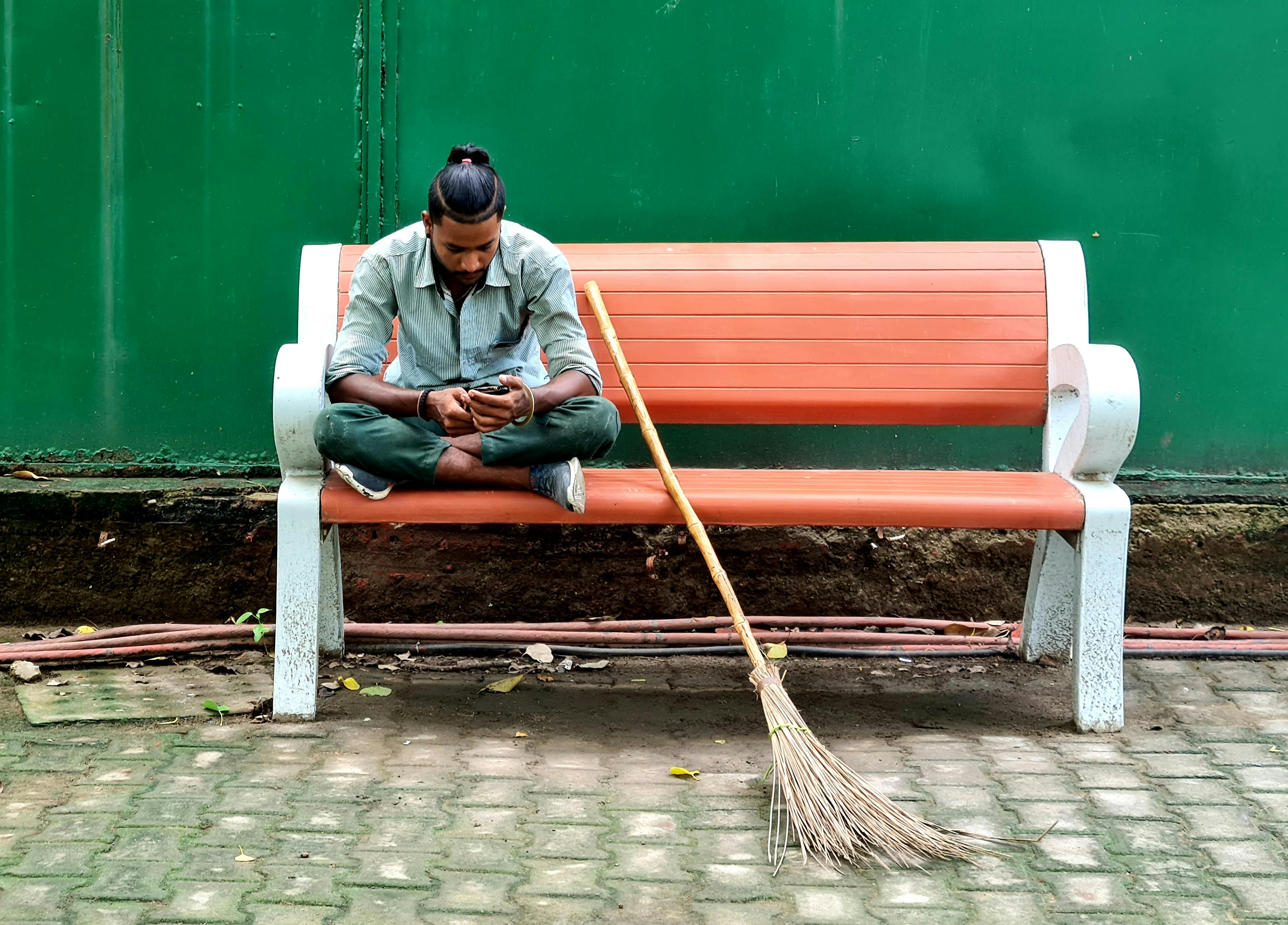 A Man Sitting on the Bench · Free Stock Photo