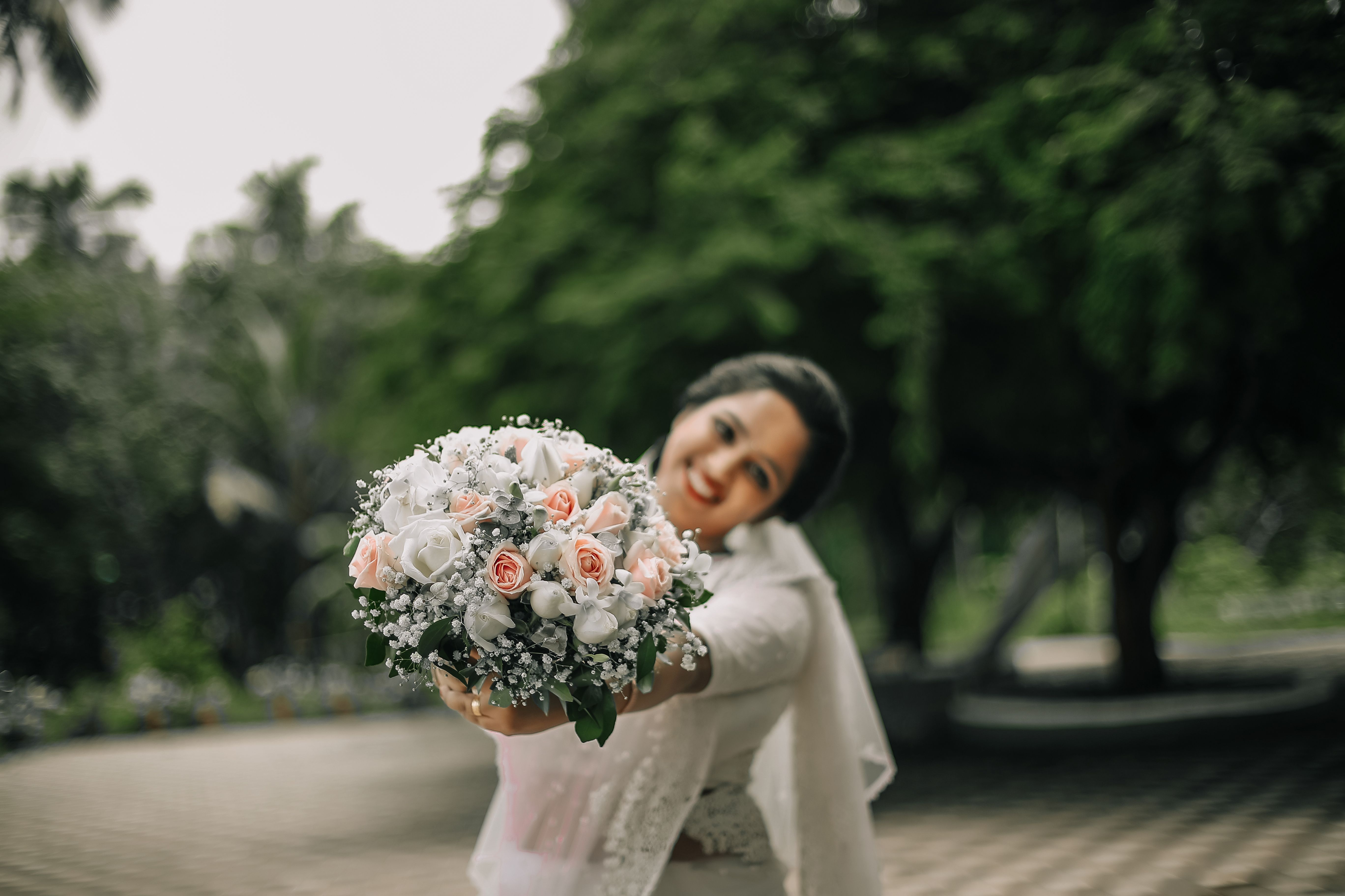 Bride Hand Holding Flowers Bouquet · Free Stock Photo