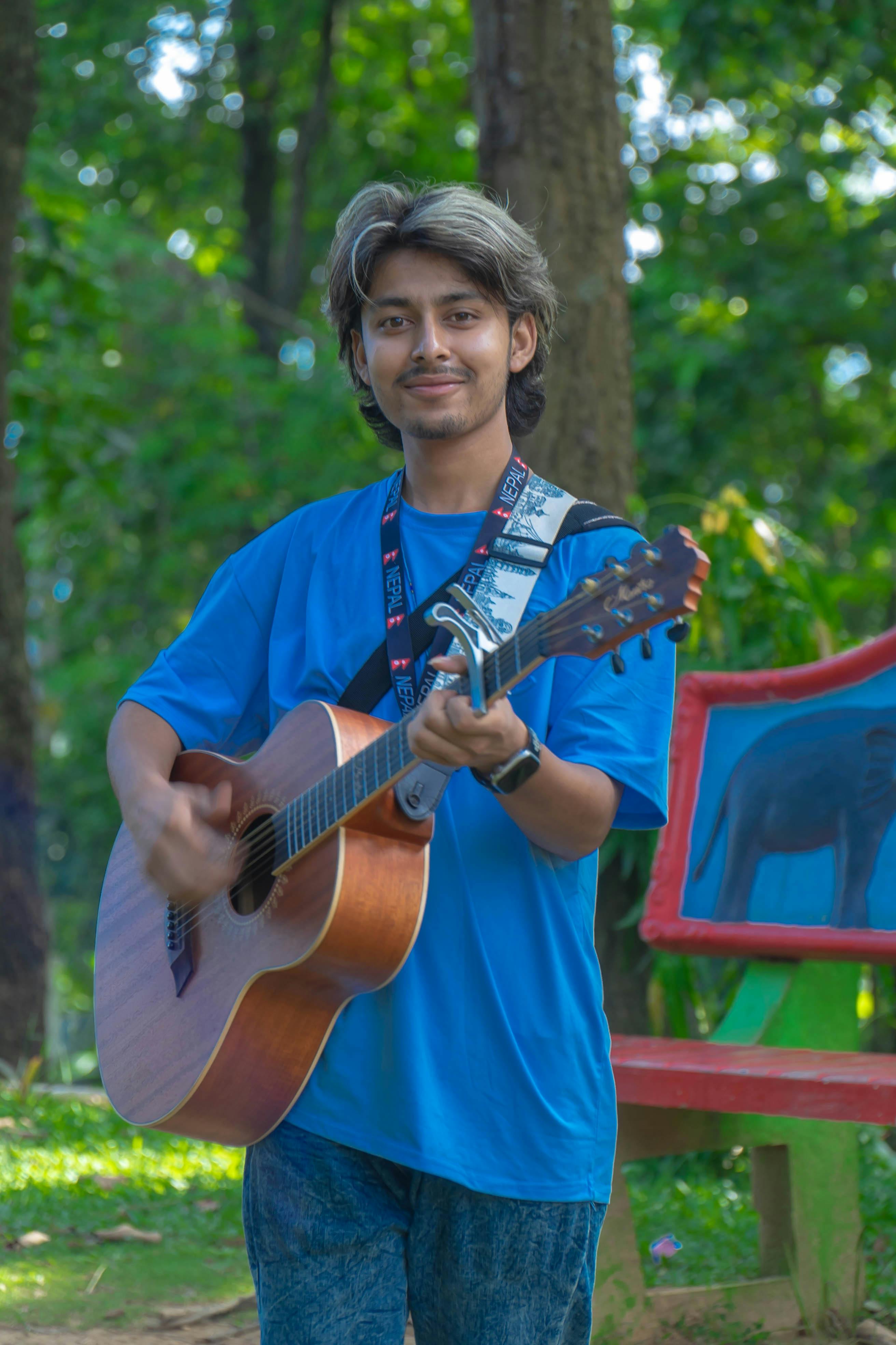 Back View of Musicians with Guitars · Free Stock Photo