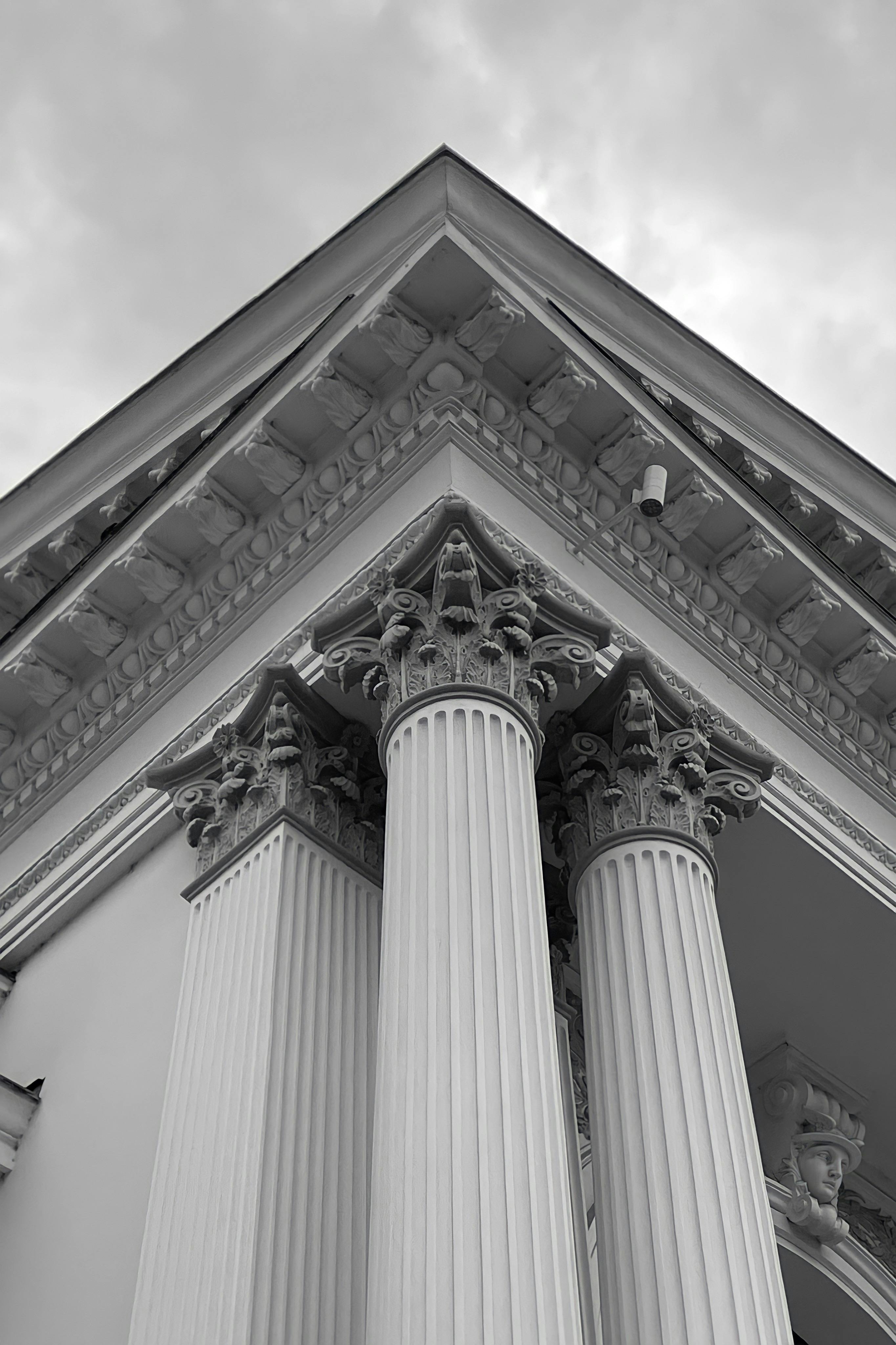 Grayscale Photo of Concrete Pillars · Free Stock Photo