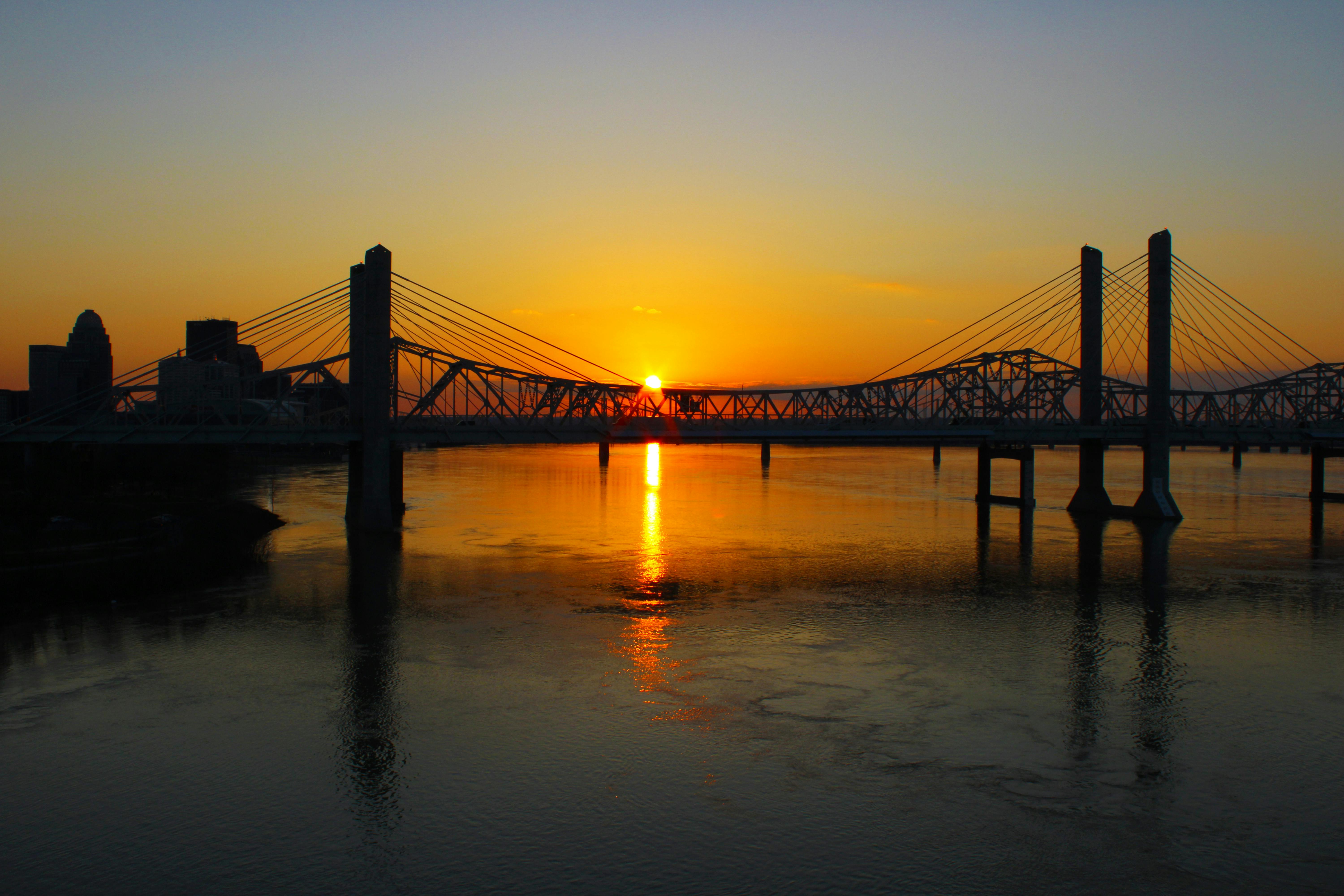 Silhouette of a Bridge during Sunset · Free Stock Photo