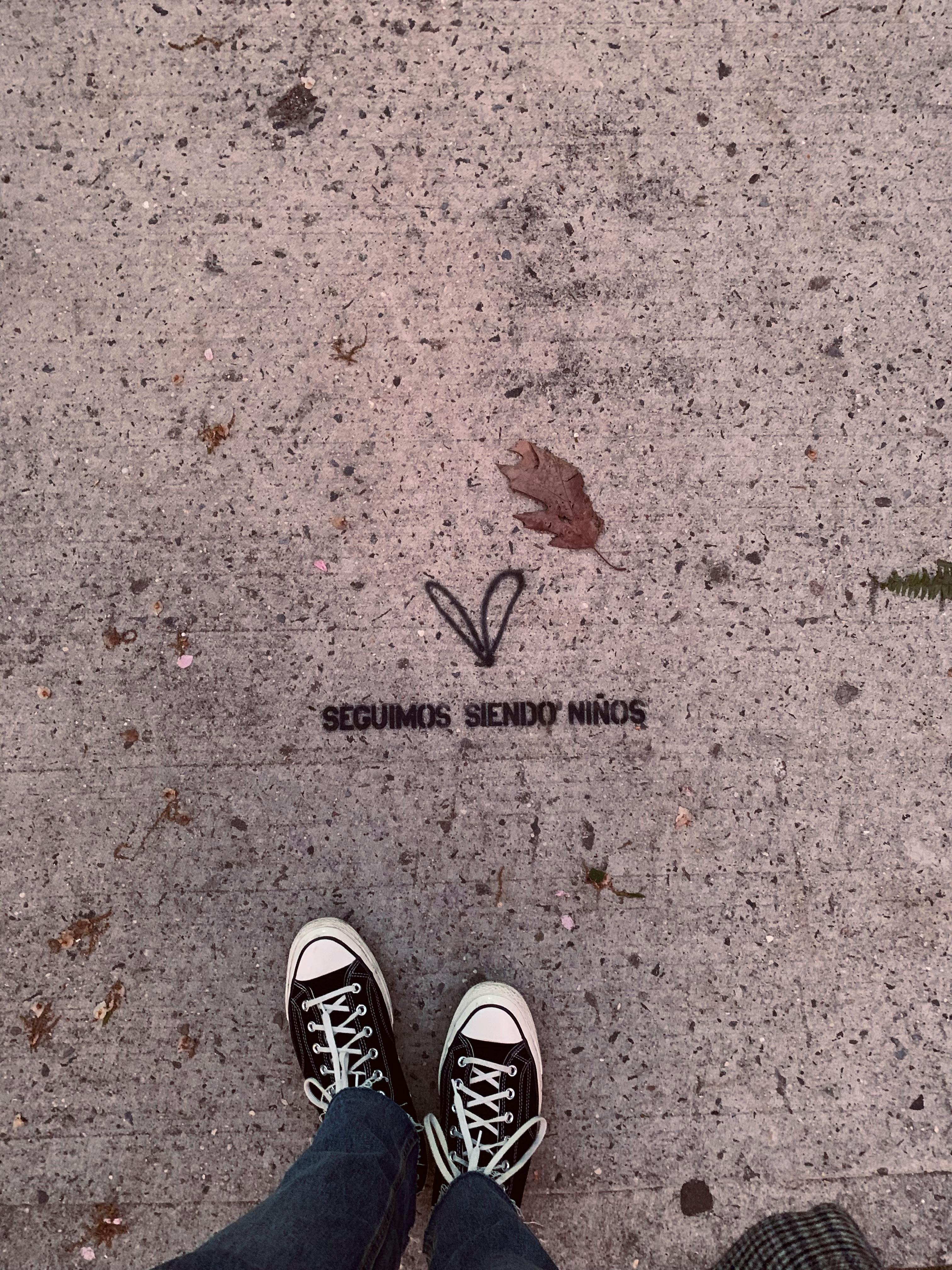 Crop woman in casual wear on asphalt pavement · Free Stock Photo