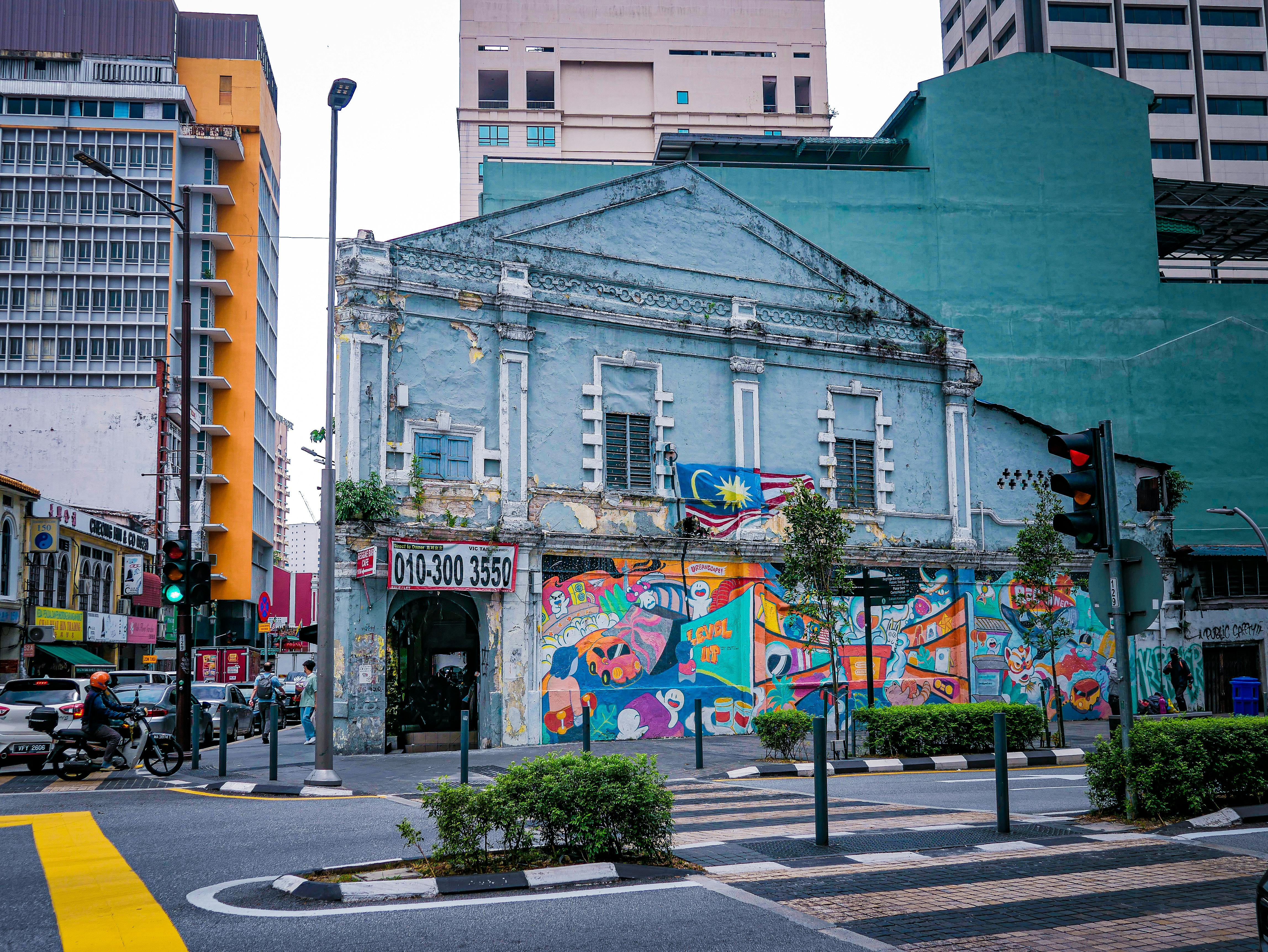 A Building with a Graffiti Art · Free Stock Photo