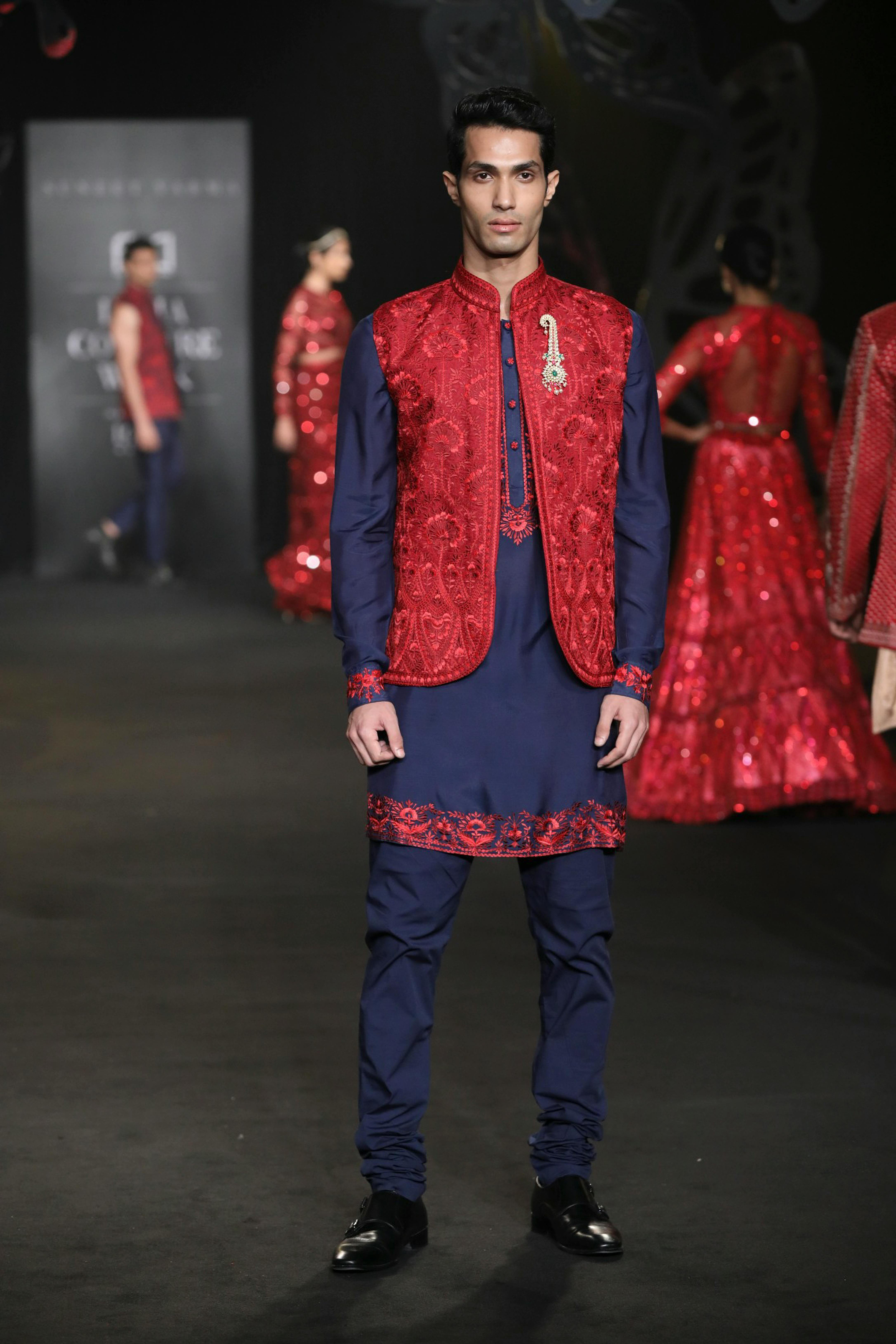 A Man in Blue and Red Traditional Clothes · Free Stock Photo