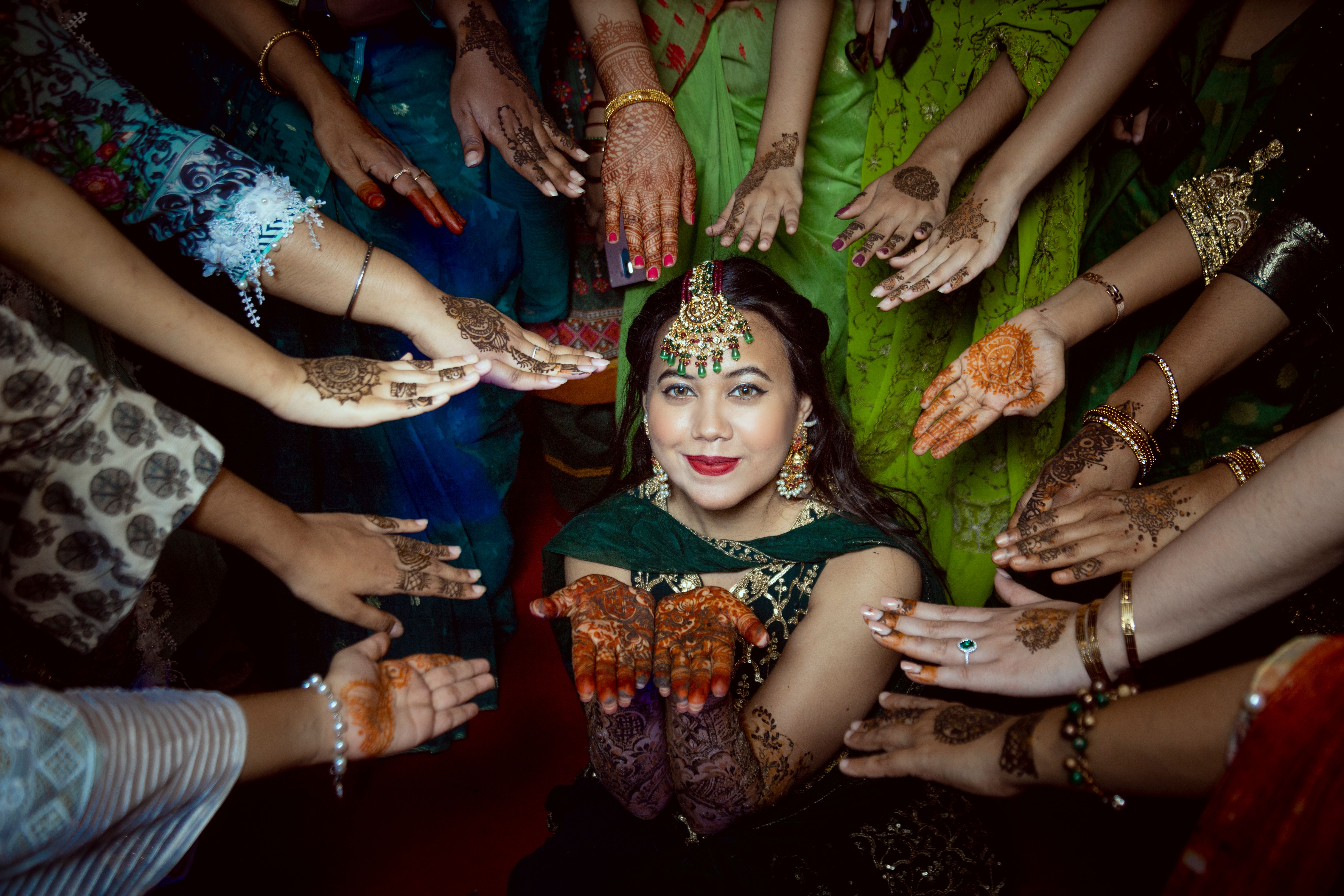 A Woman with Bindi and Skin Decorations on Hands · Free Stock Photo