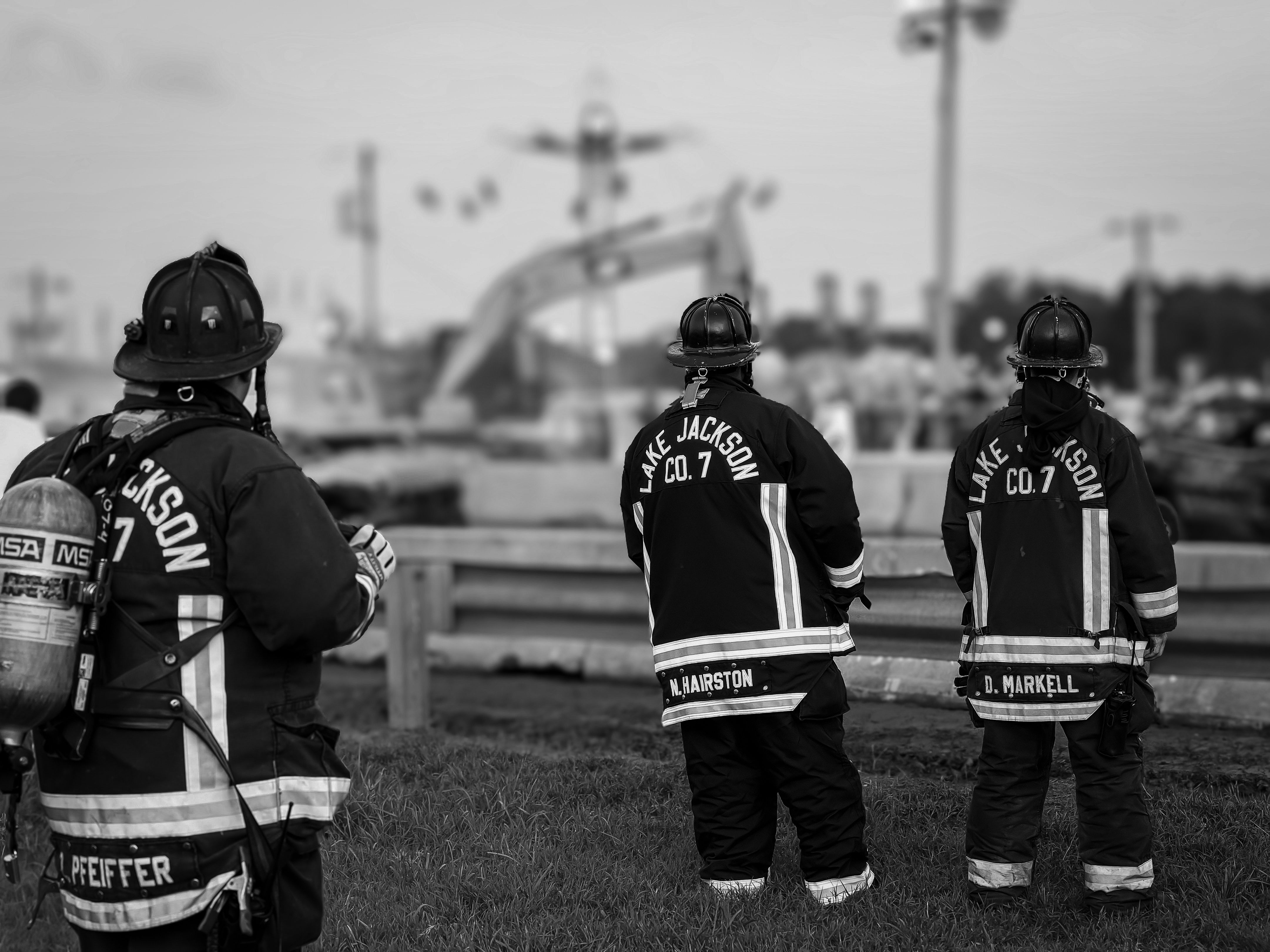 Grayscale Photo of Firefighters · Free Stock Photo