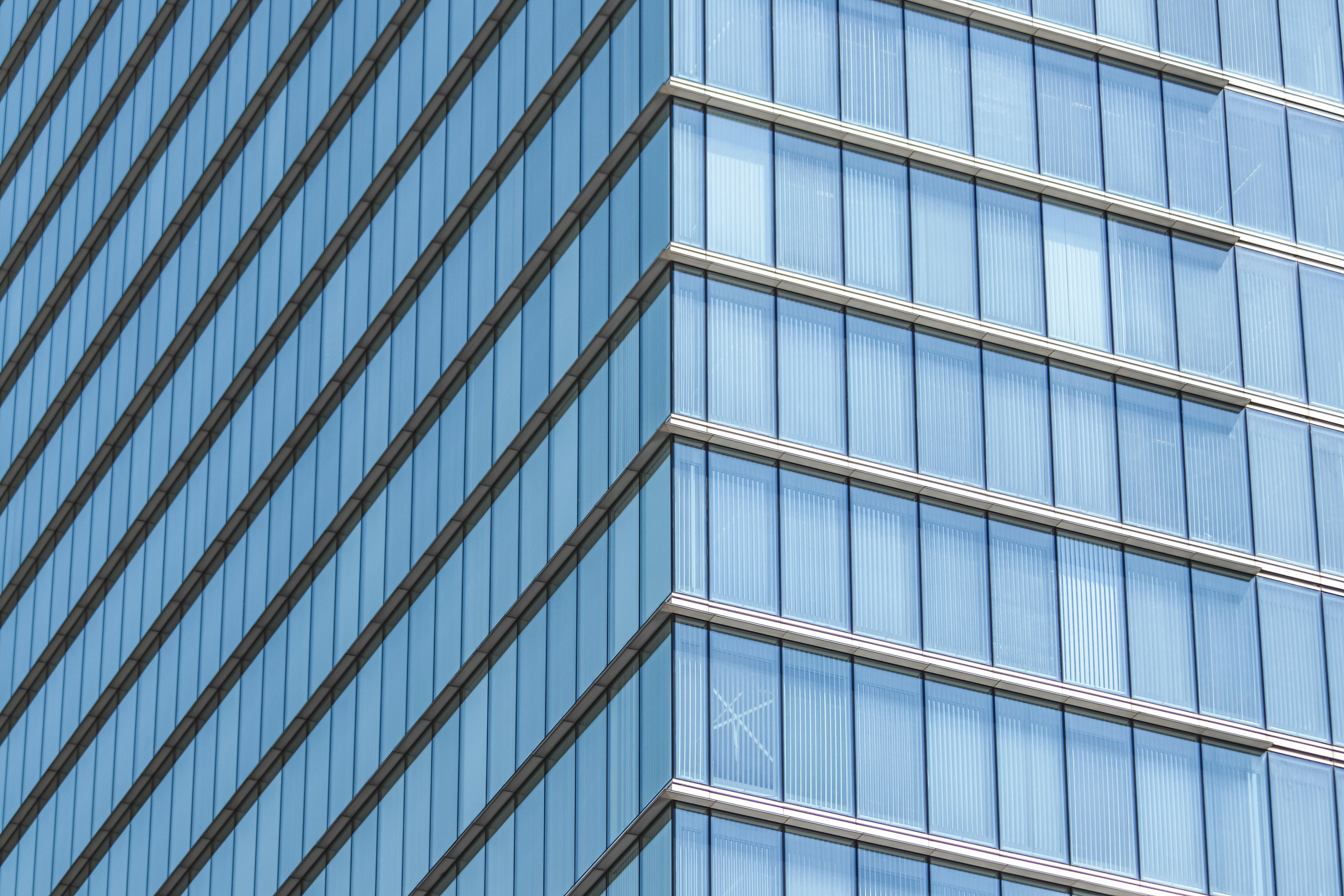 Close-Up Photo of Glass Panel Windows of a Building · Free Stock Photo