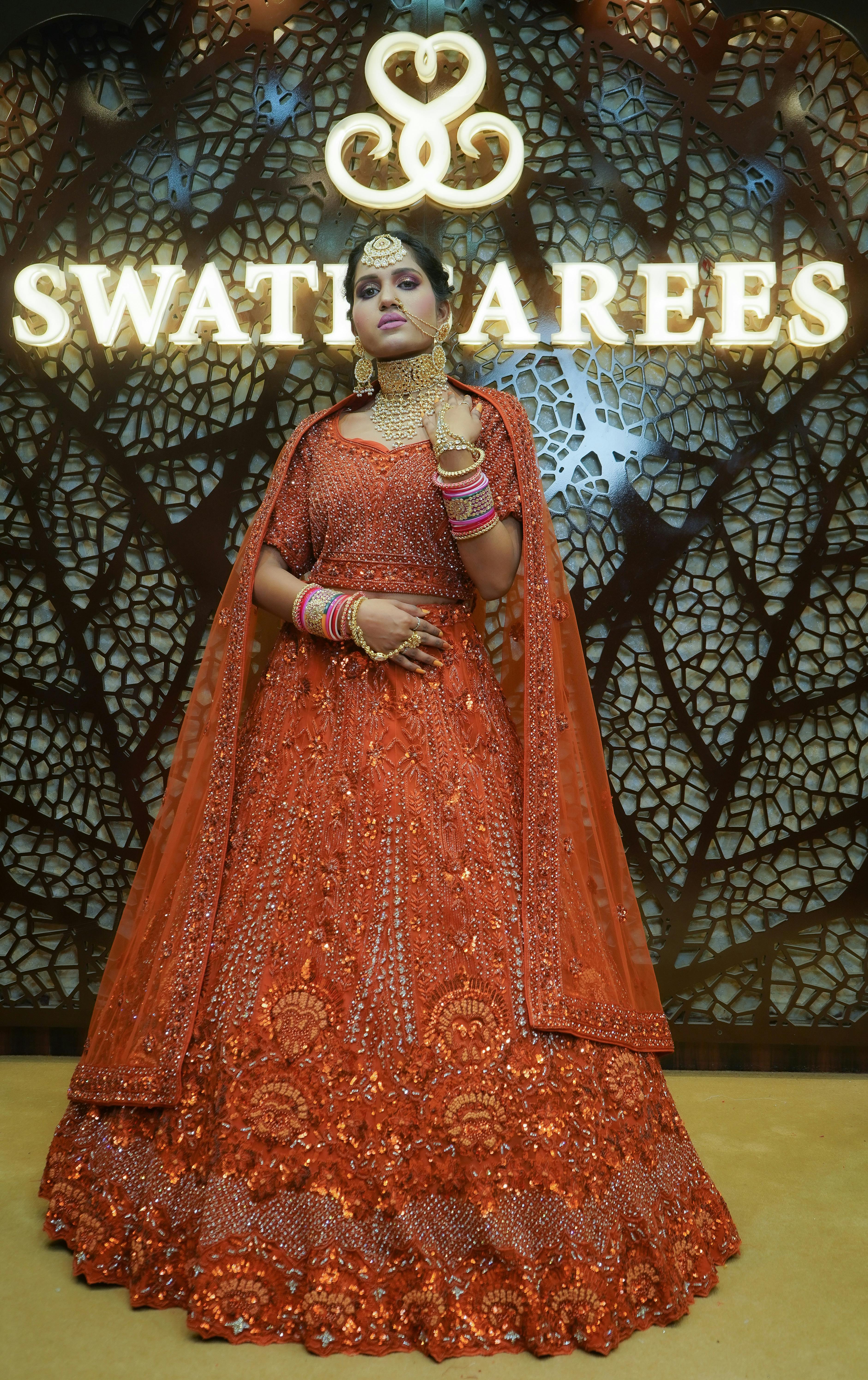 Woman in Traditional Clothing and Jewelries · Free Stock Photo