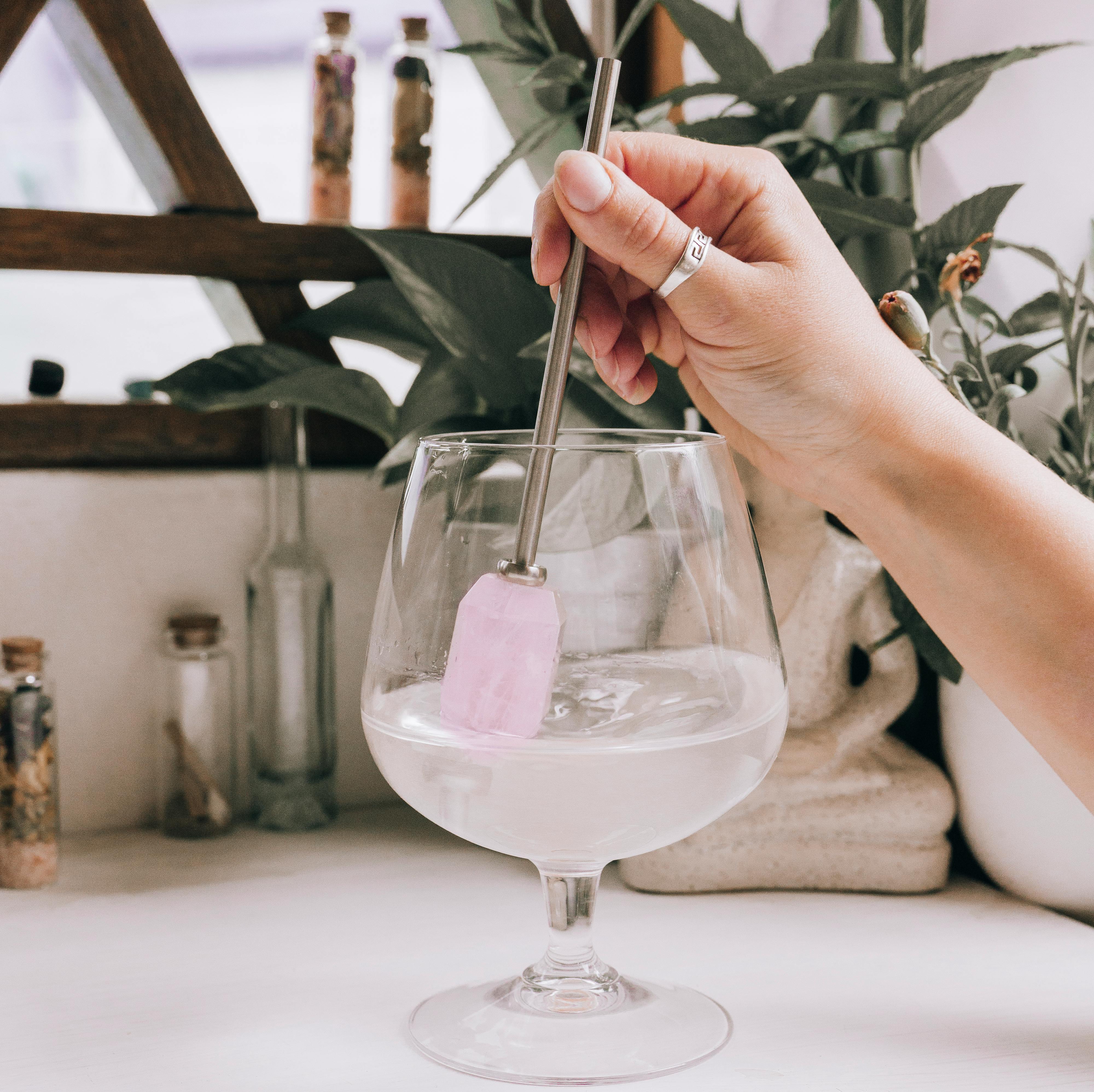 Person Stirring a Cocktail · Free Stock Photo