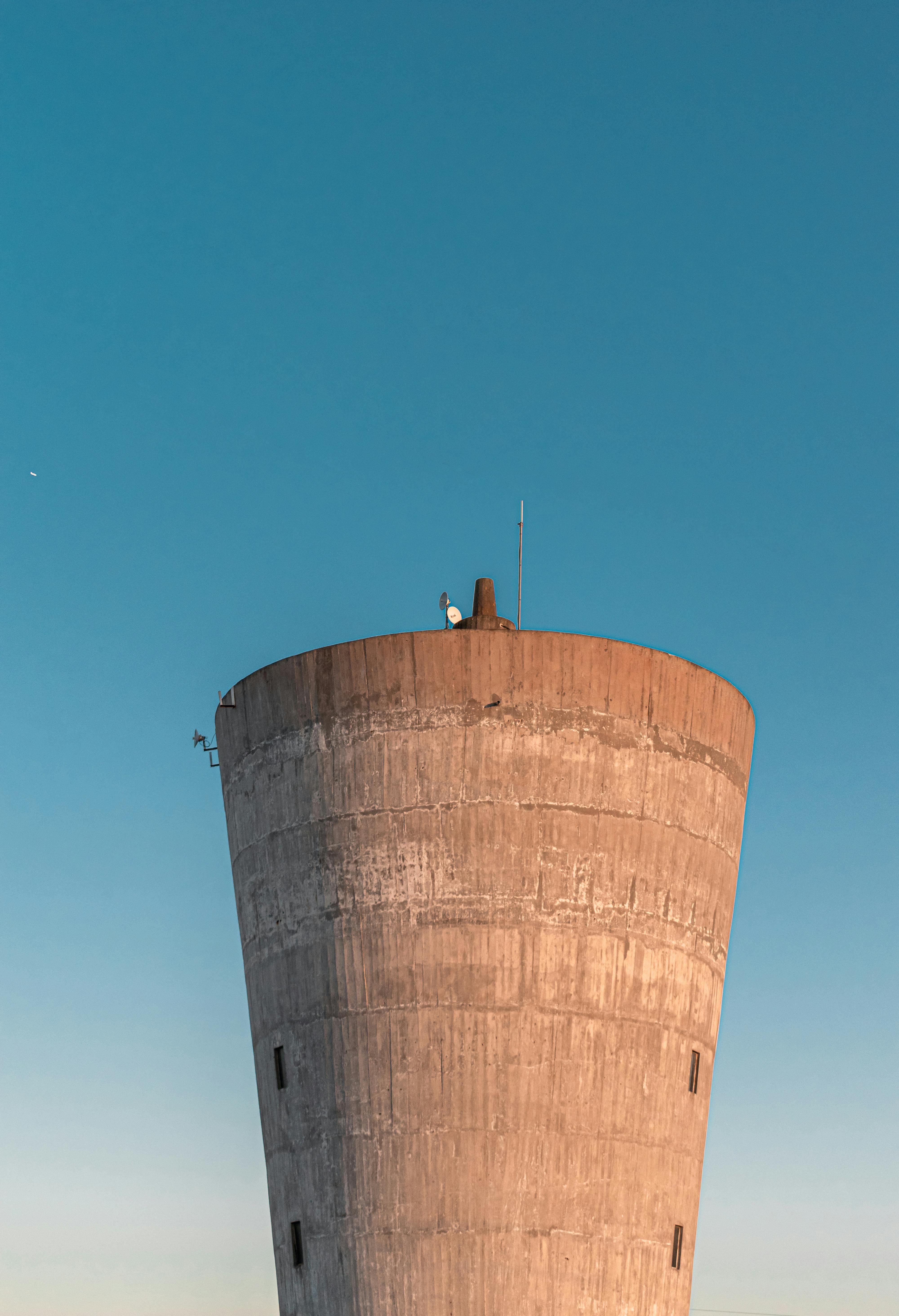 Concrete Tower Against Sky · Free Stock Photo