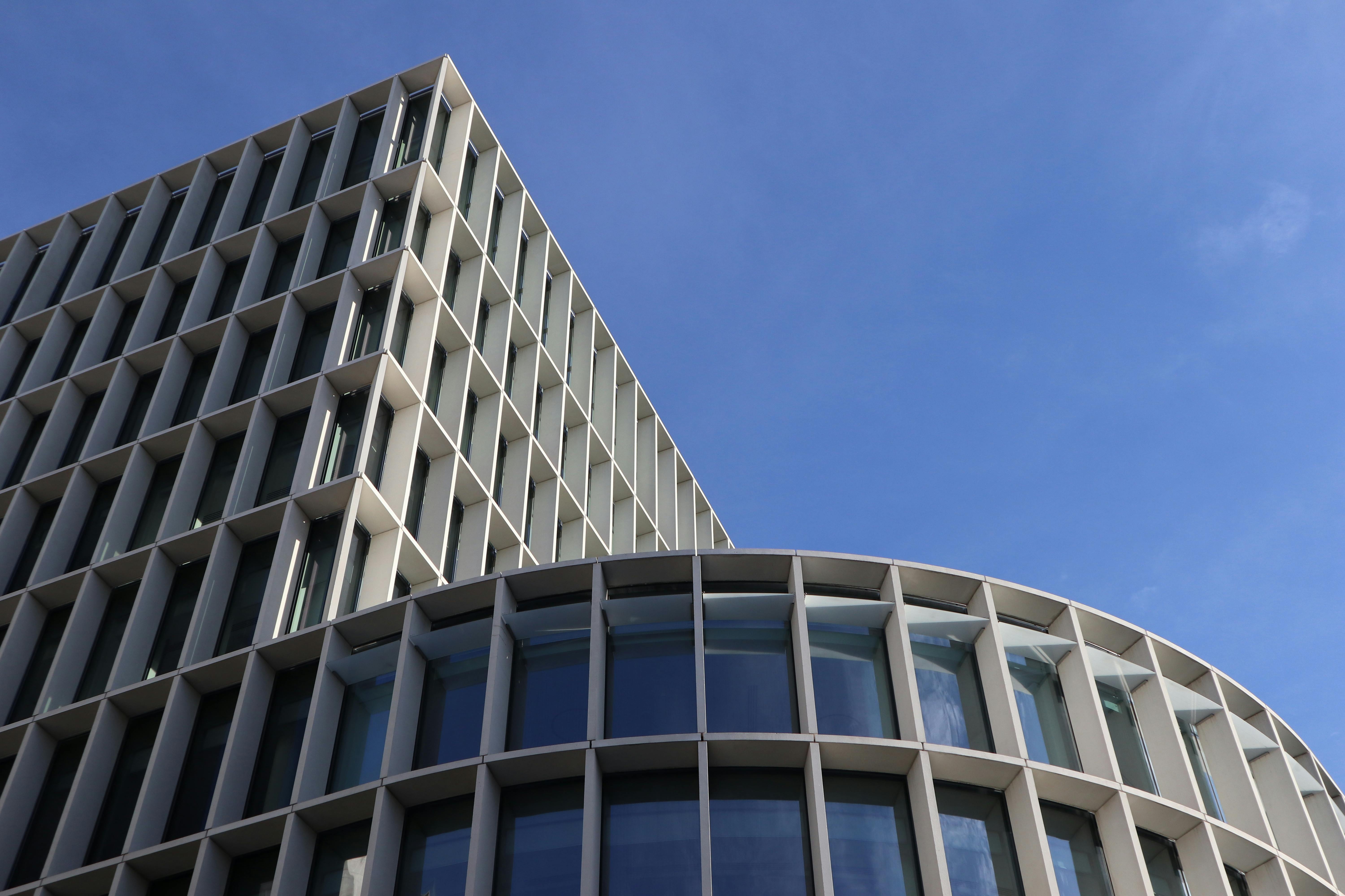 Low-angle Photography of Gray Spiral Building · Free Stock Photo