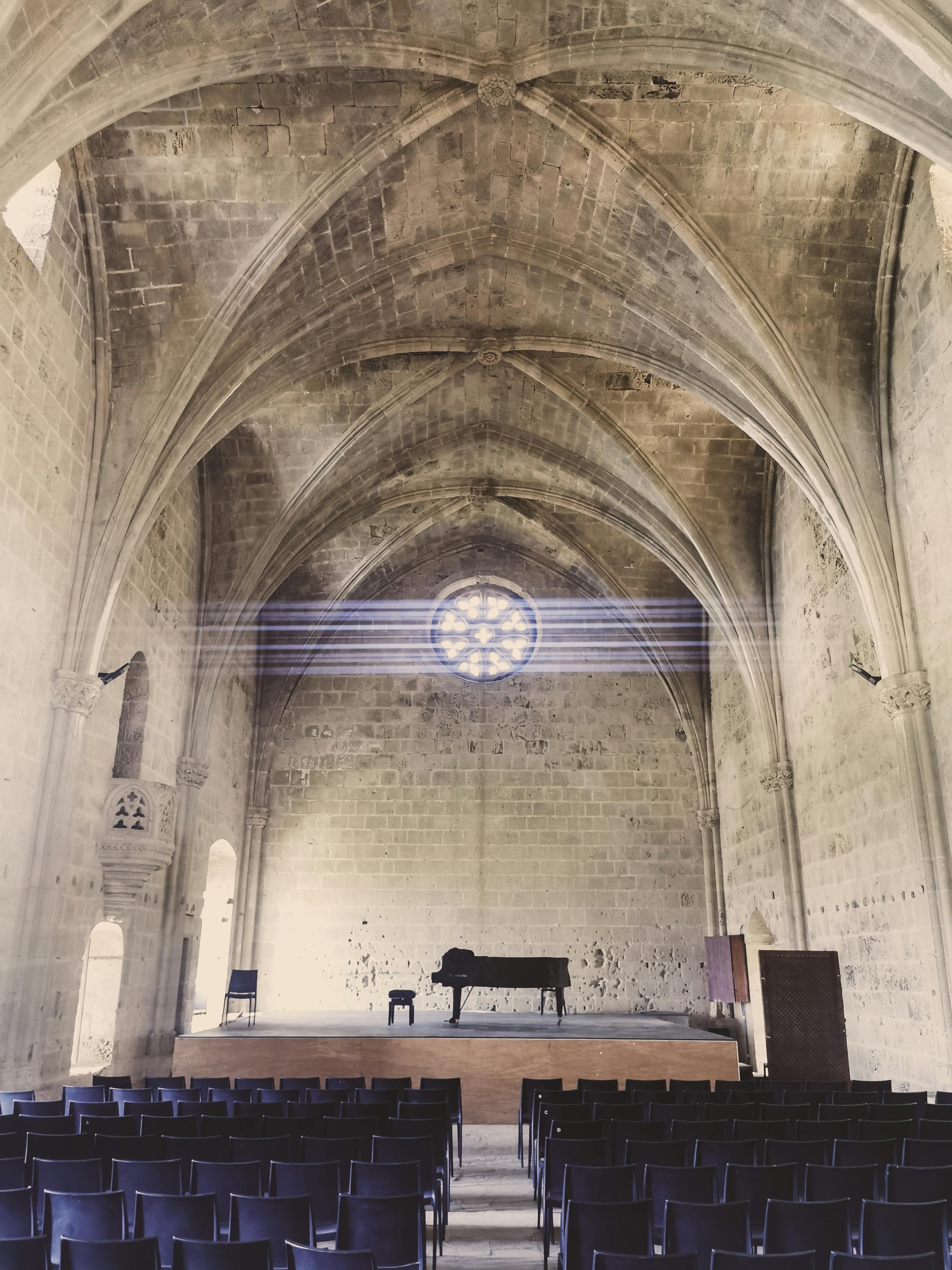 Cathedral Interior with Piano and Audience · Free Stock Photo