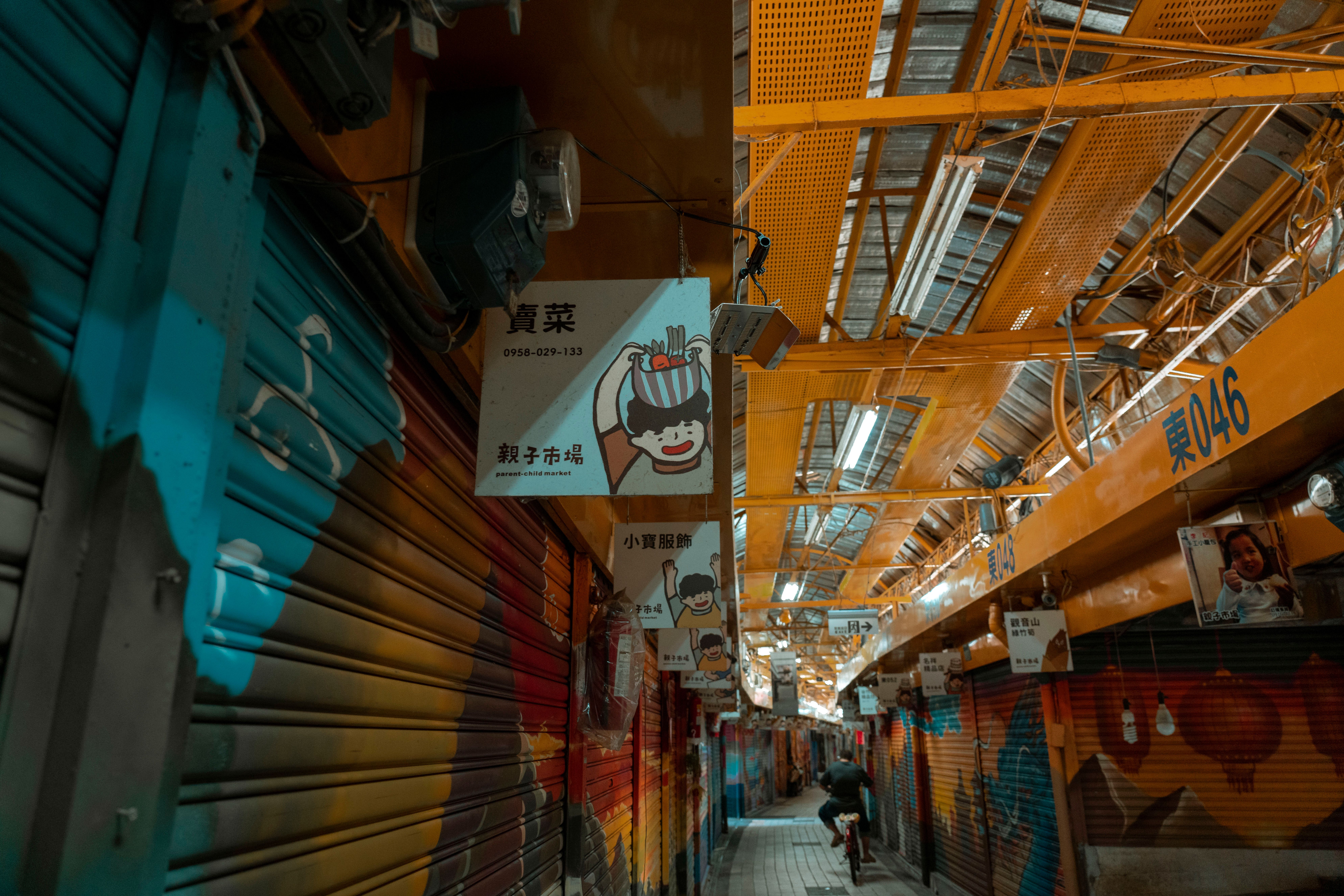 Signages of the Stores in a Market · Free Stock Photo