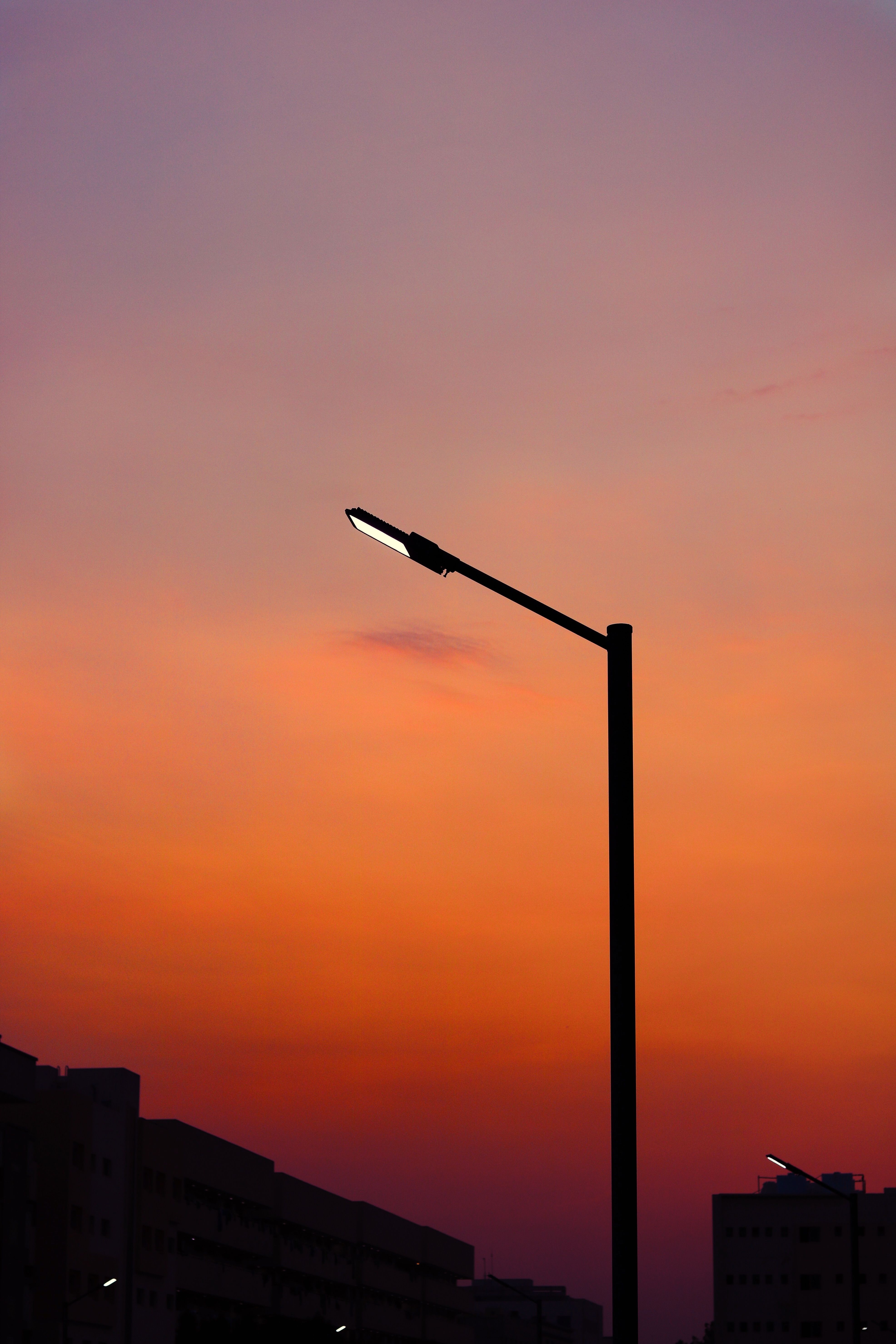 Silhouette of Street Lights during Sunset · Free Stock Photo