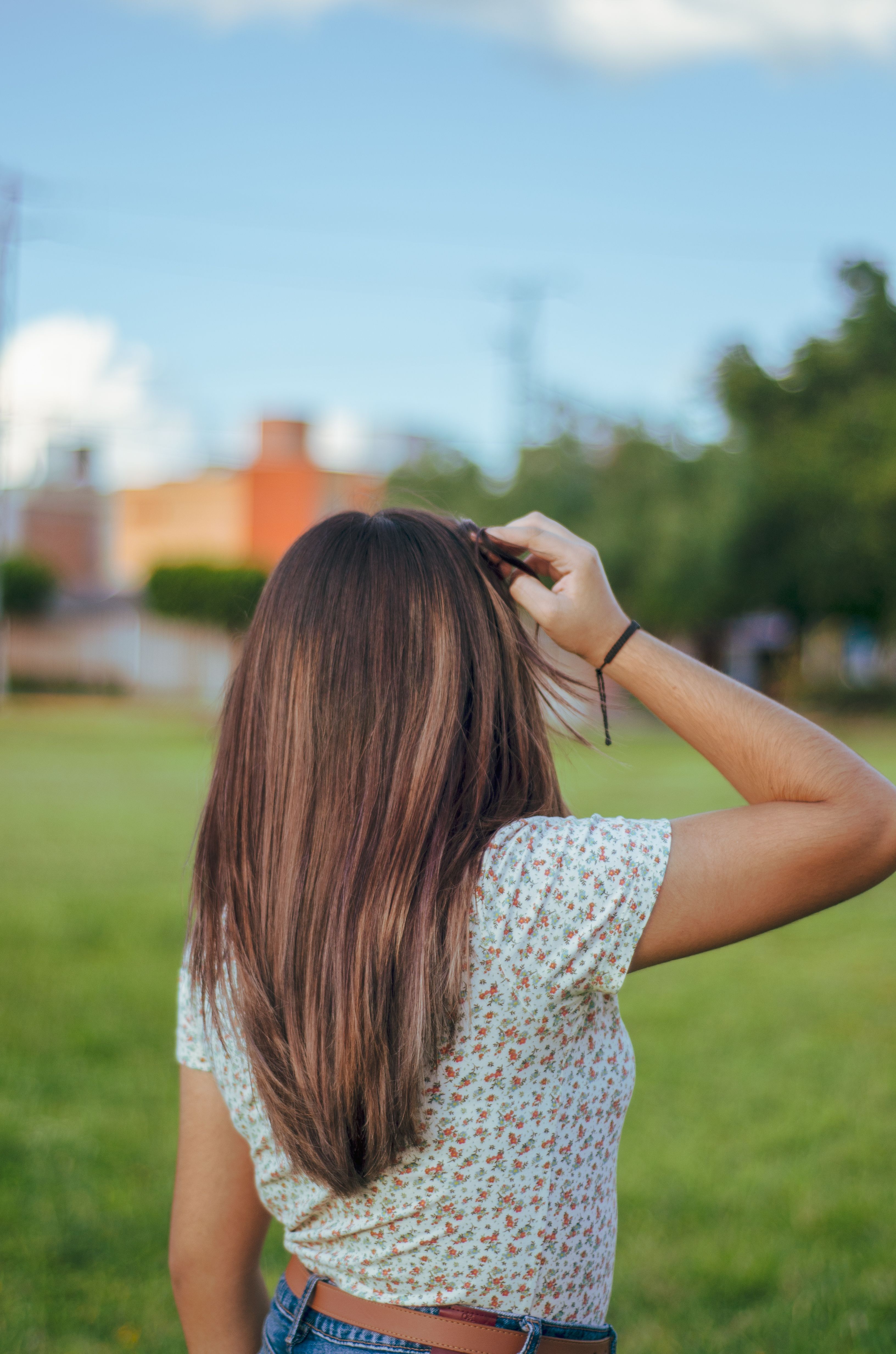 A Woman Wearing Floral Top · Free Stock Photo