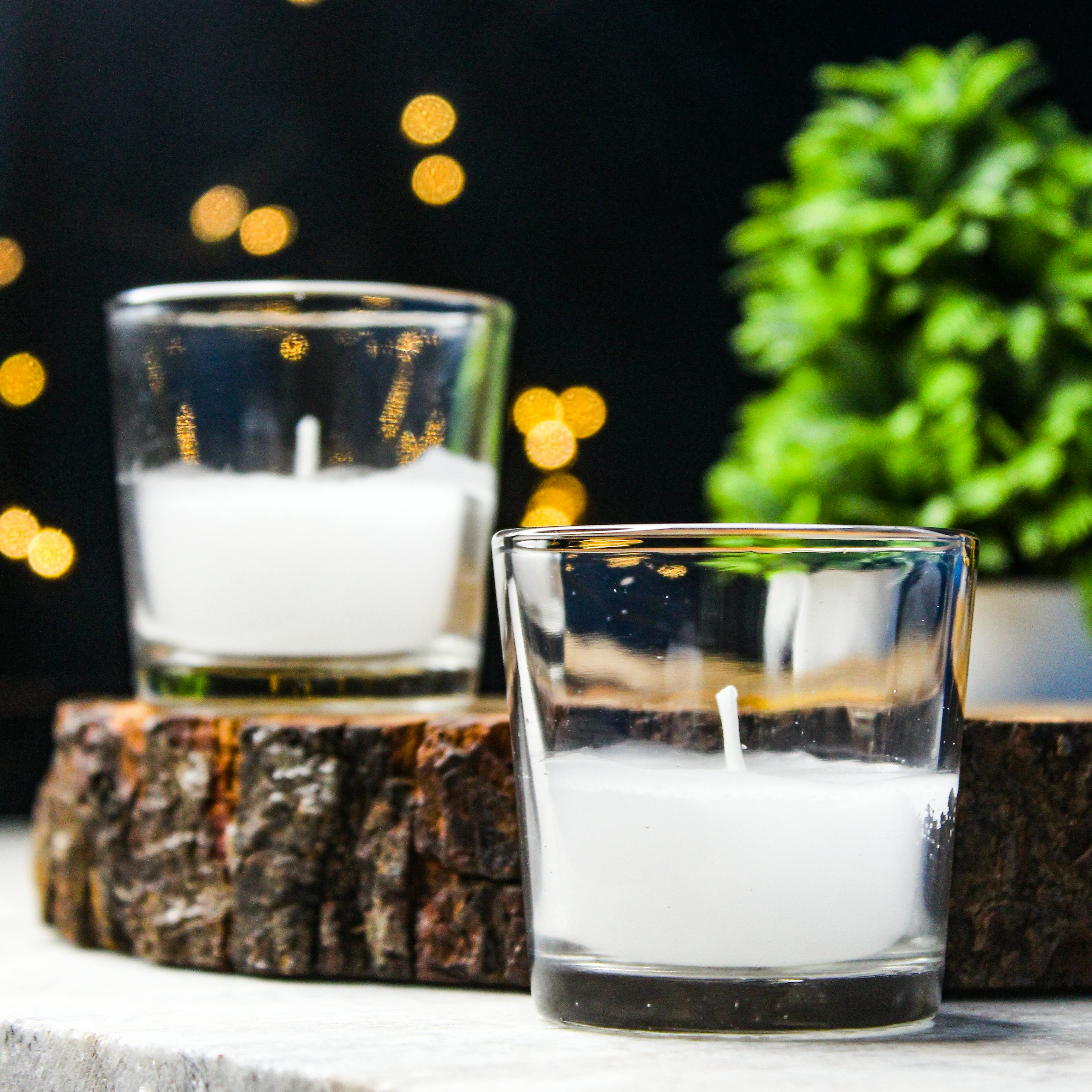 Close-Up Shot of Glass Candles · Free Stock Photo