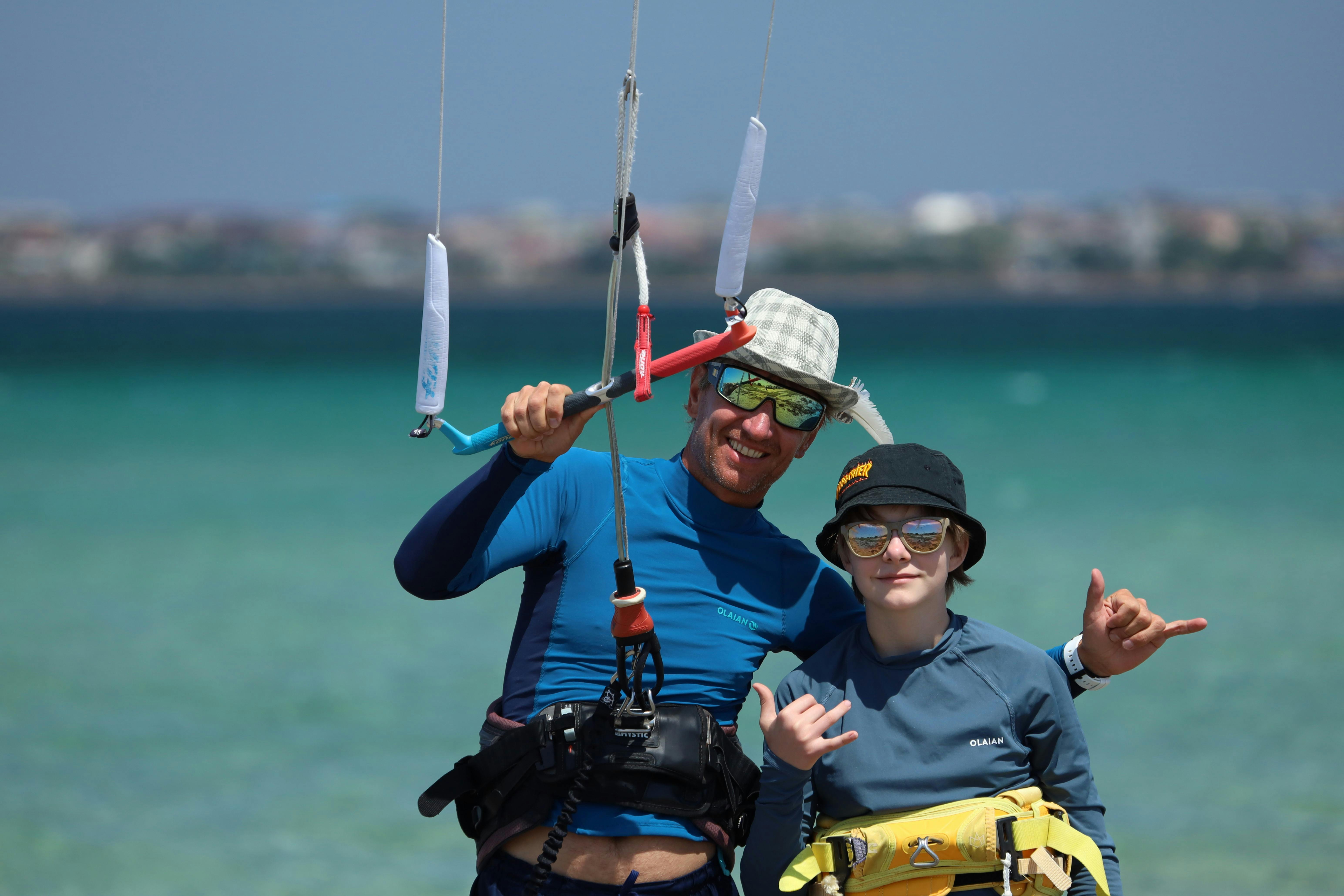 Man Holding Red and White Fishing Rod · Free Stock Photo