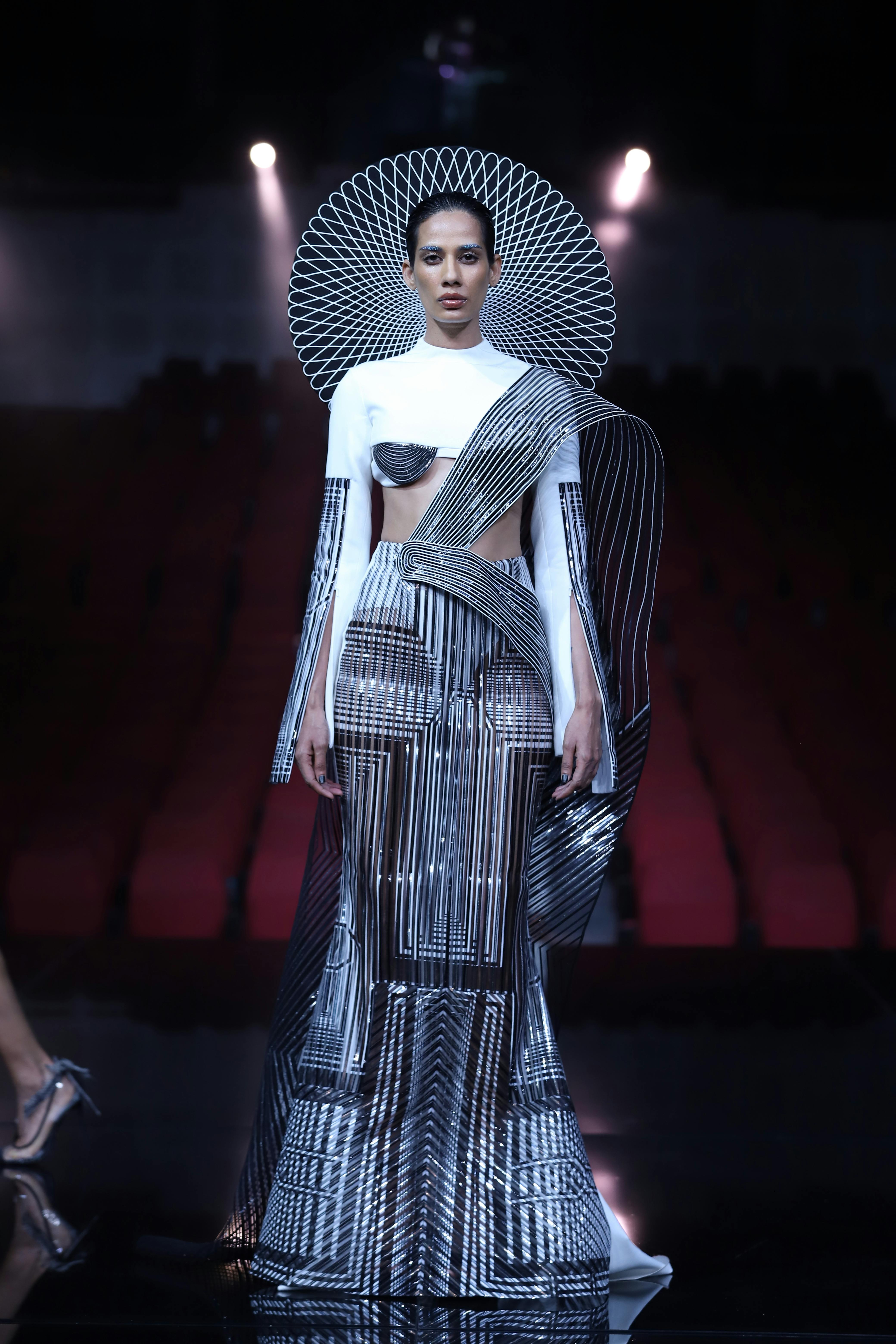 Model in Glamour Dress on Catwalk · Free Stock Photo